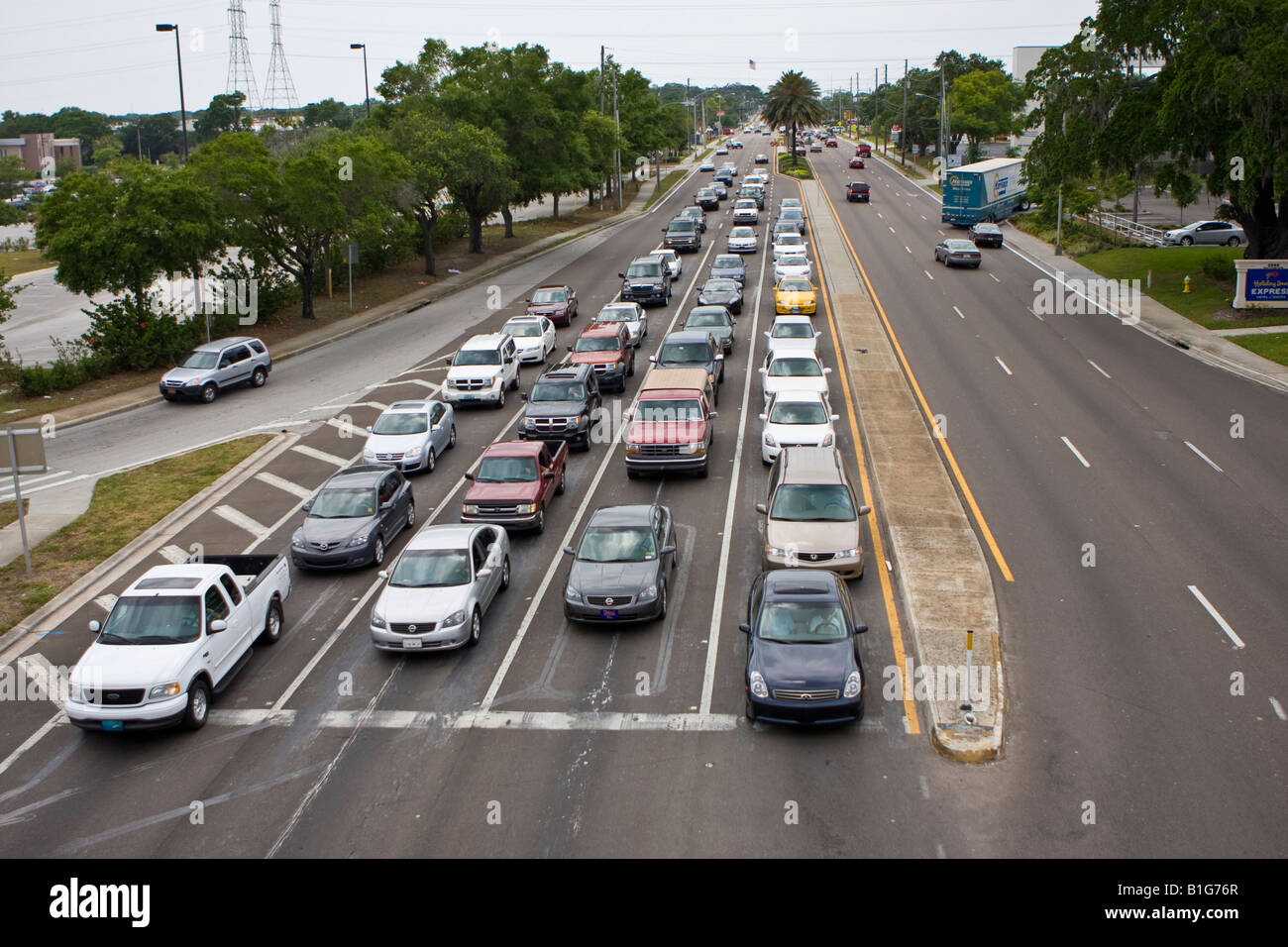 Busy Roadway with Cars Stopped at a Traffic Light Stock Photo - Alamy