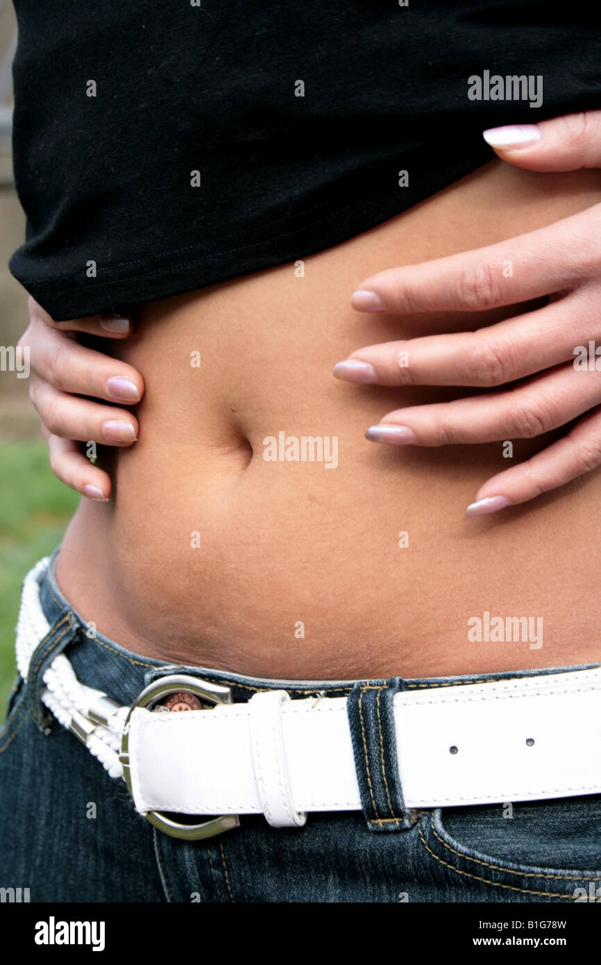 Woman midriff navel hi-res stock photography and images - Alamy