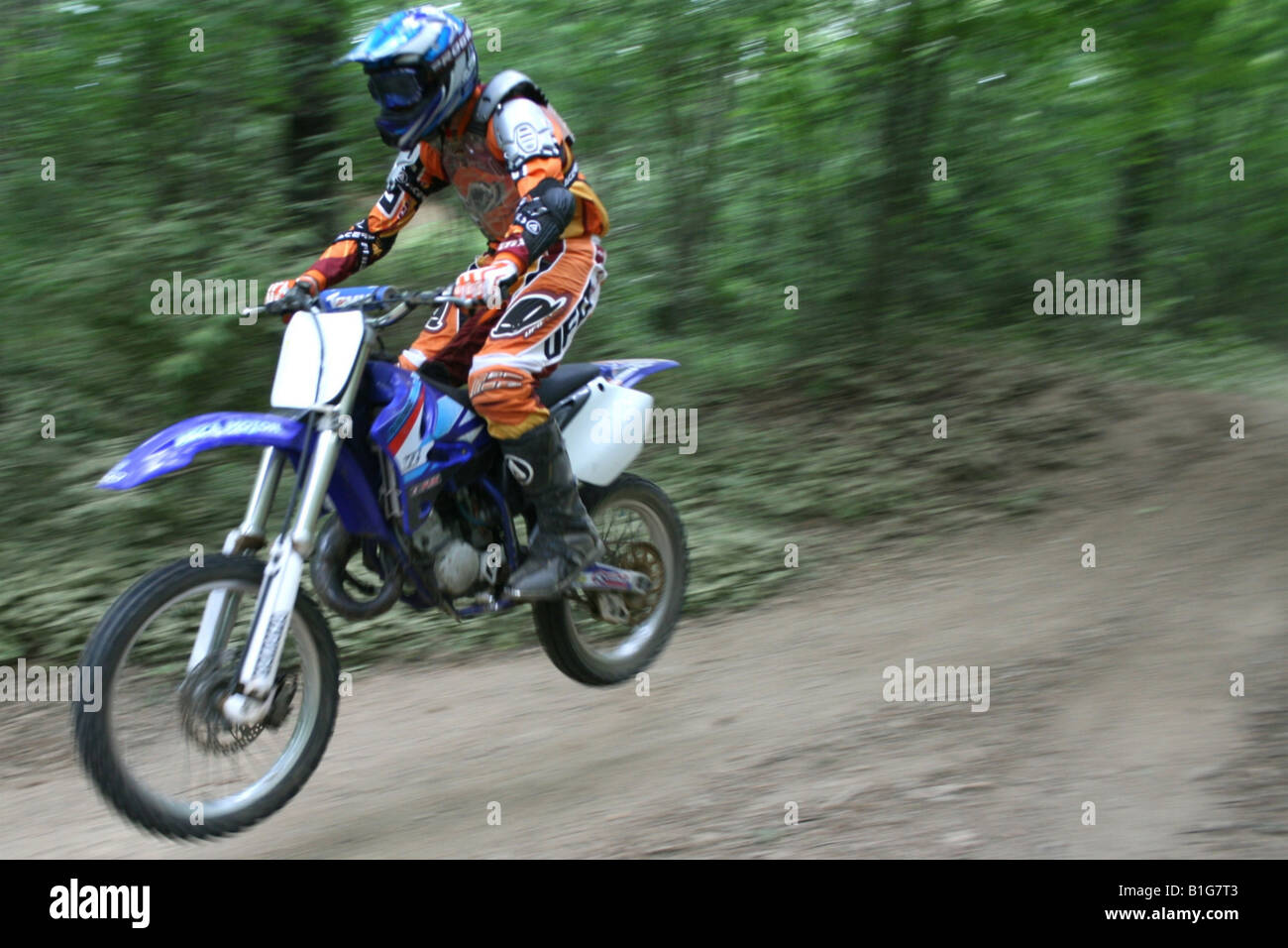 Side view of a person riding motorcycle Stock Photo - Alamy