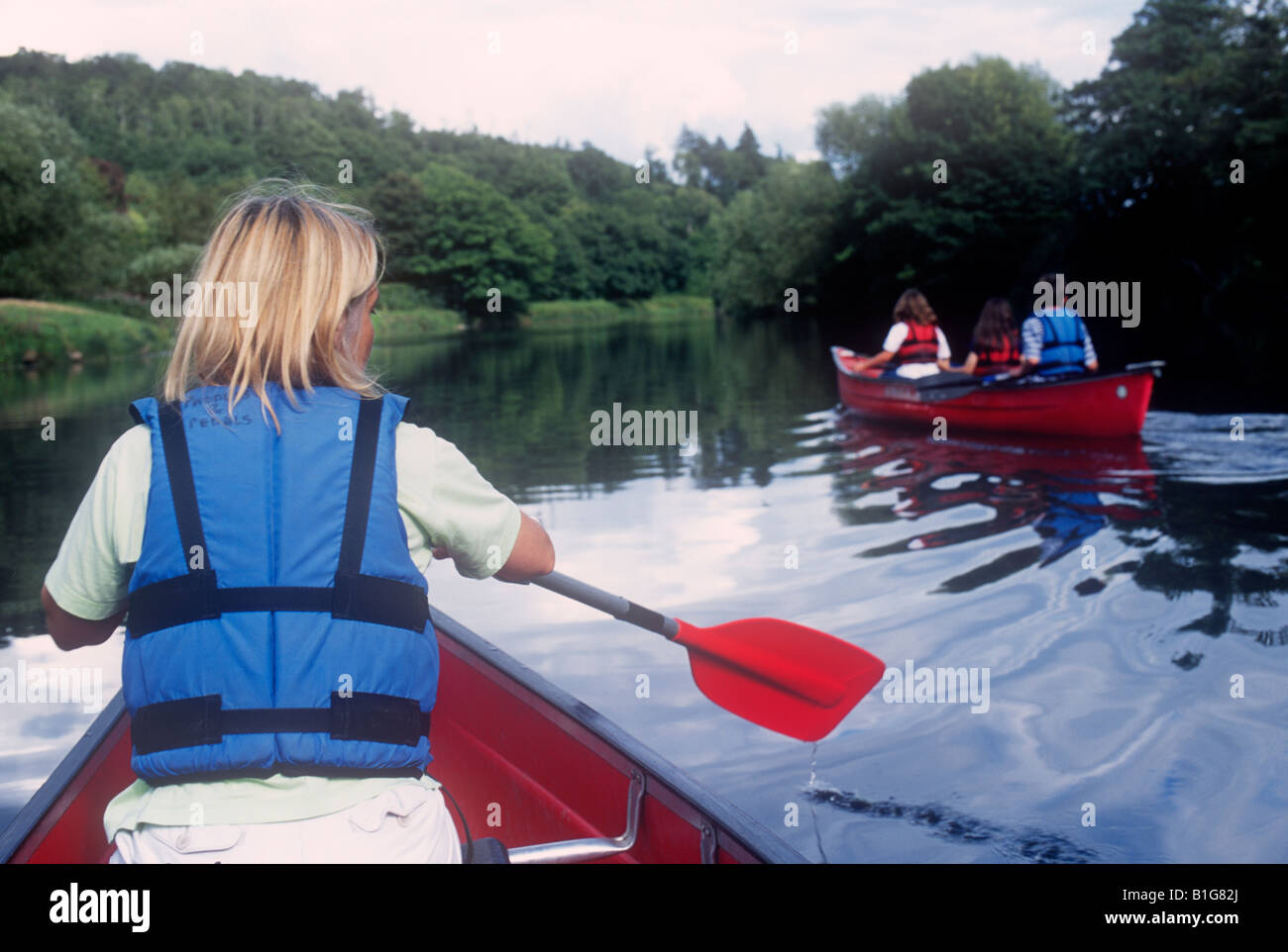Family canoeing on the River Wye near Hay on Wye Stock Photo - Alamy