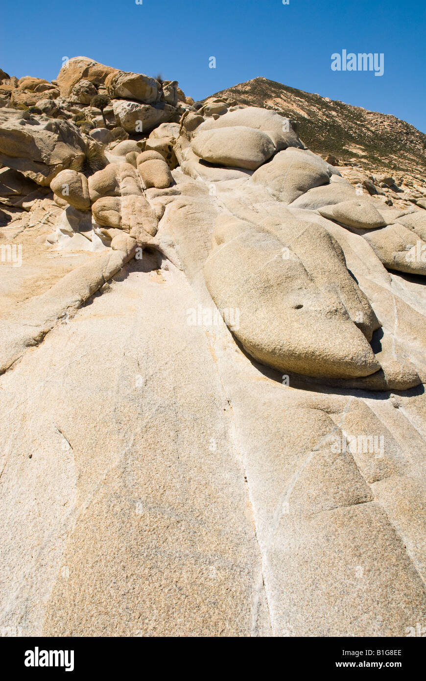 Coastal rock formations at Livada Beach Tinos Greece Stock Photo - Alamy