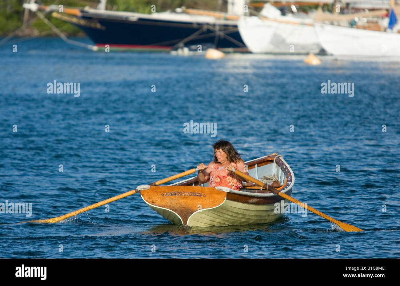 Woman rows green boat hi-res stock photography and images - Alamy