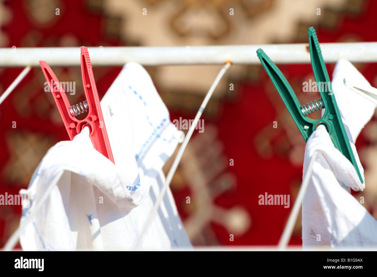 Closeup of clothes with clothes pins Stock Photo - Alamy
