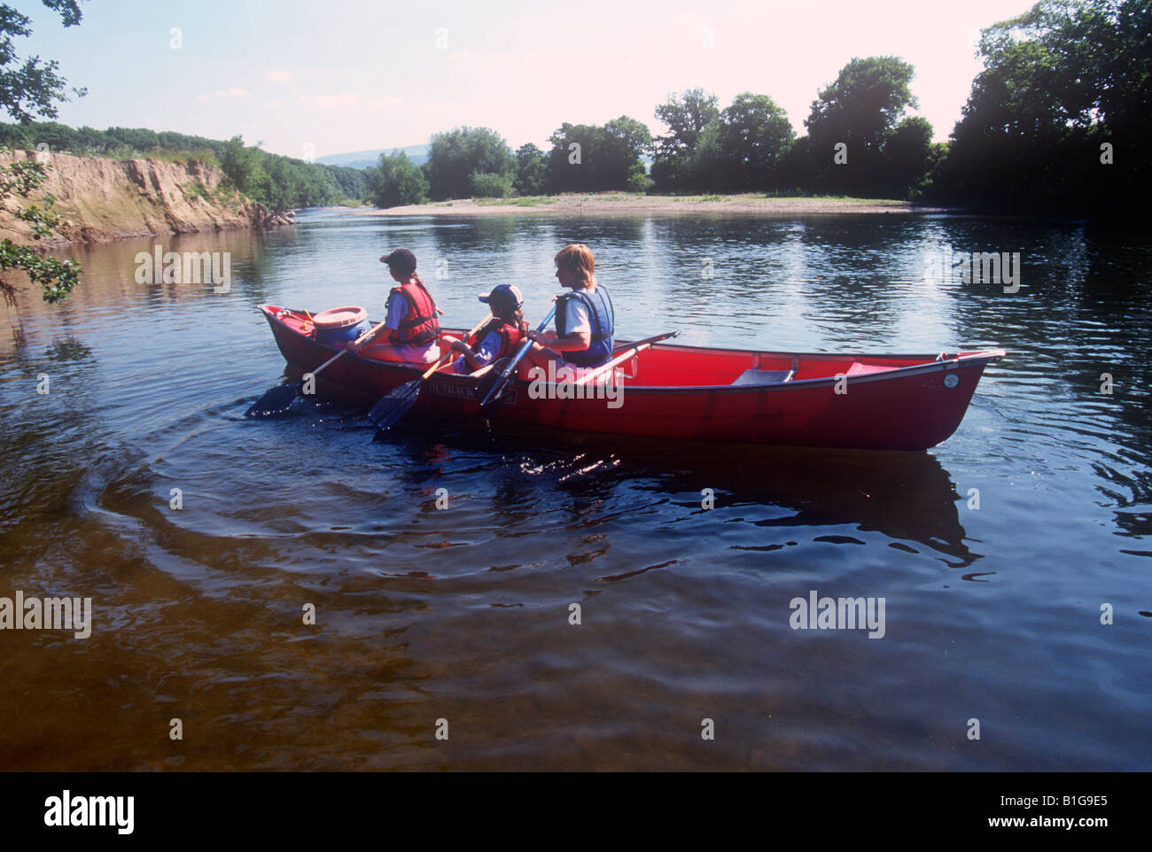 Family canoeing on the River Wye near Hay on Wye Stock Photo - Alamy