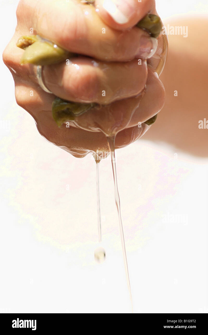 Hand squeezing grapes hi-res stock photography and images - Alamy