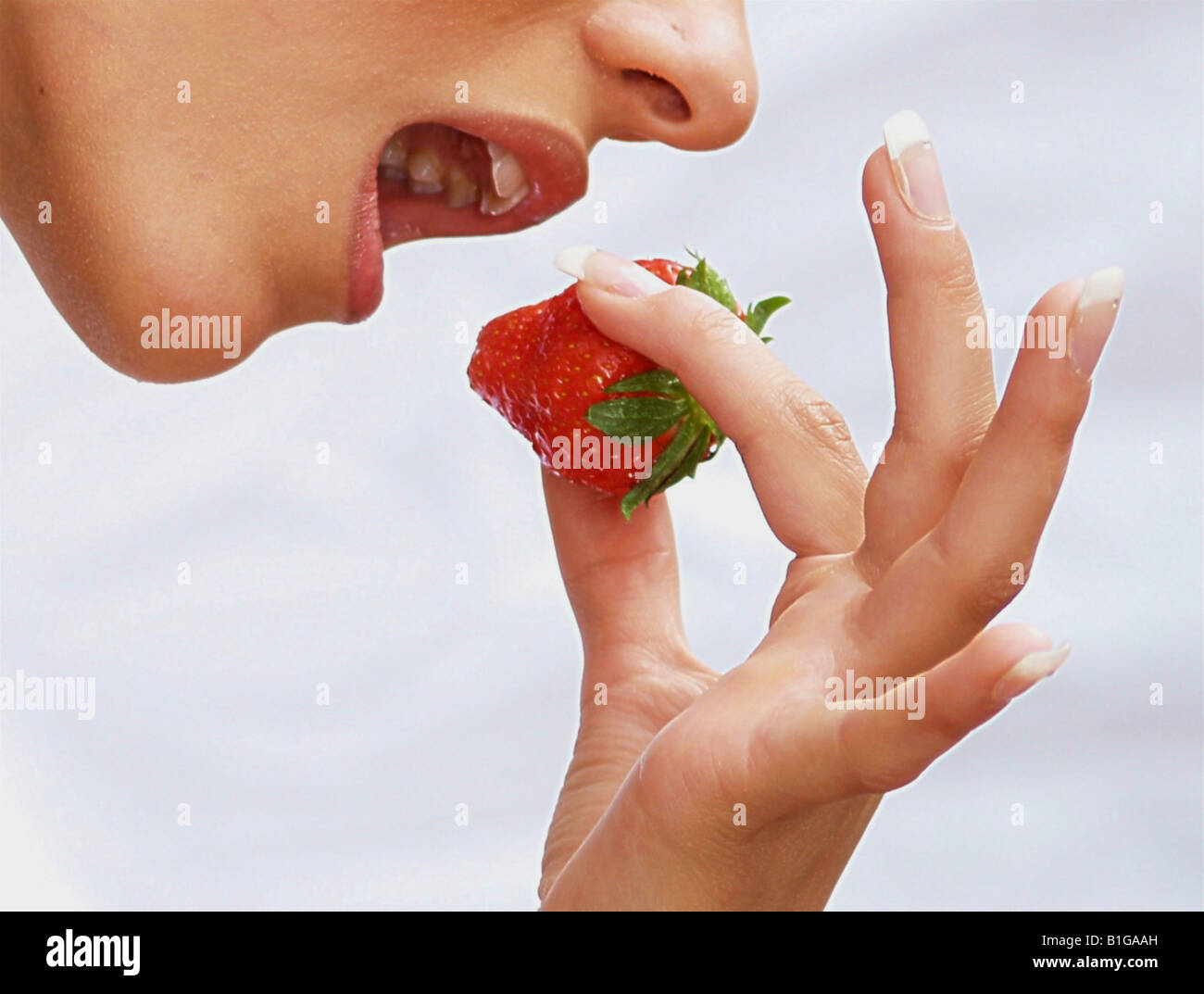 Hands strawberry cut out hi-res stock photography and images - Alamy