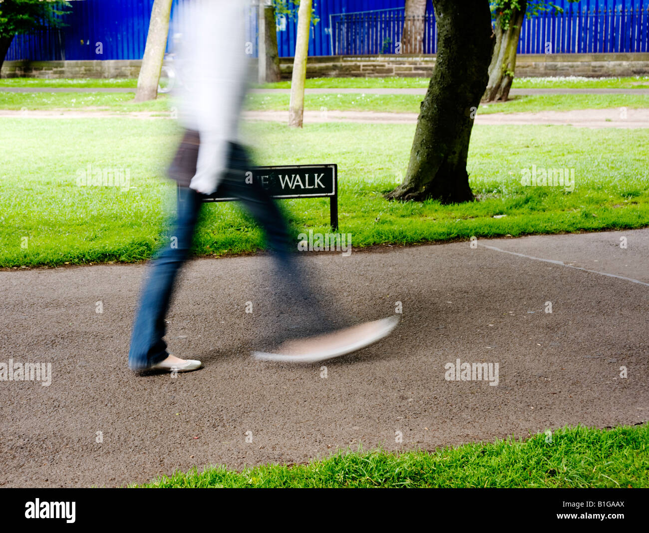 Walking is Healthy and good for you, Walker in park Stock Photo - Alamy