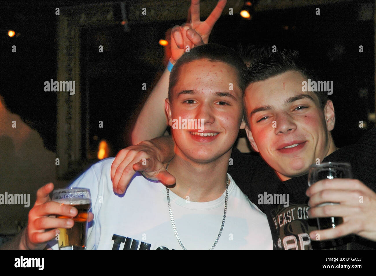 teenage boys having an alcoholic drink Stock Photo - Alamy