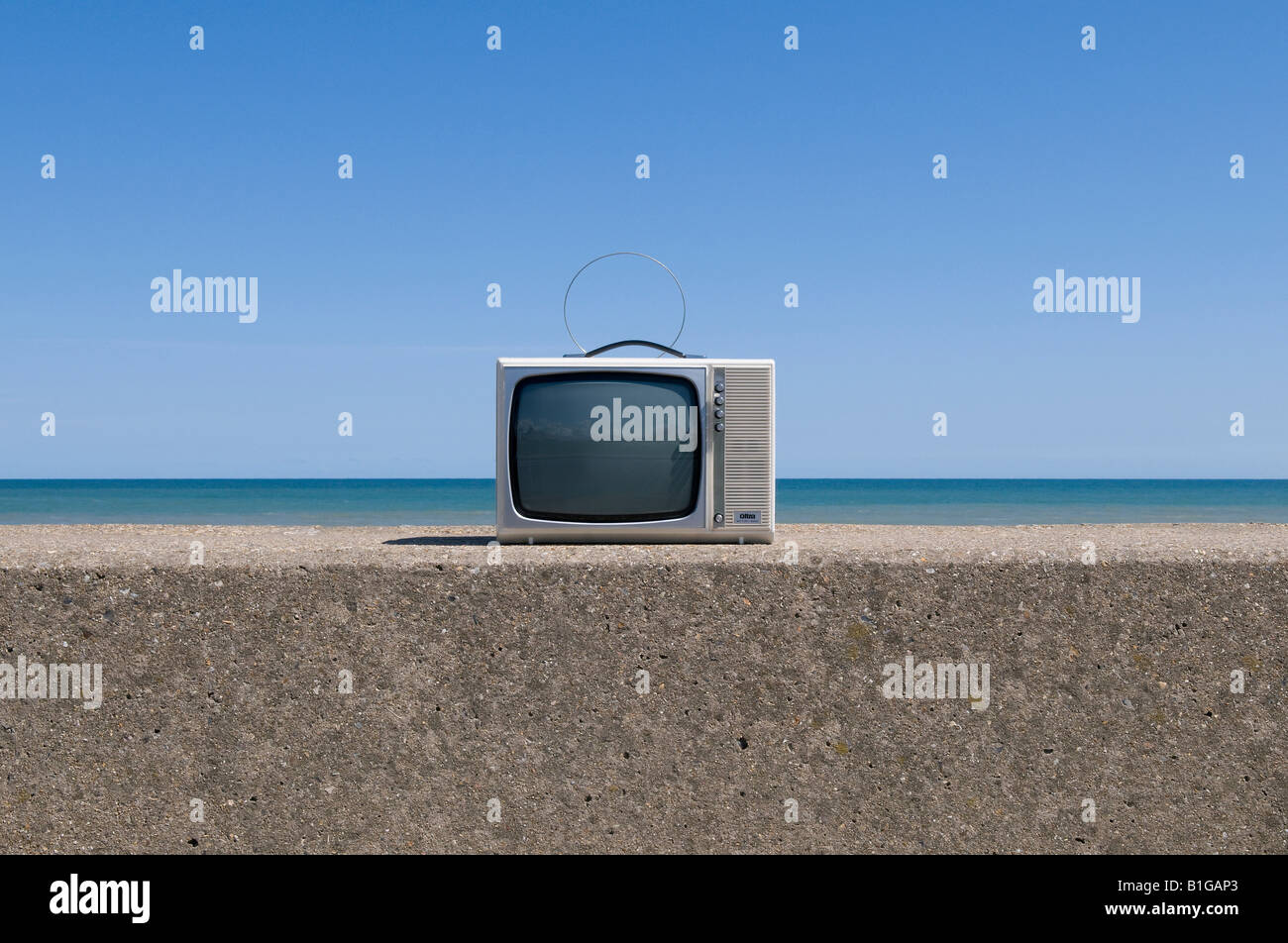 retro style portable television on sea wall Stock Photo - Alamy