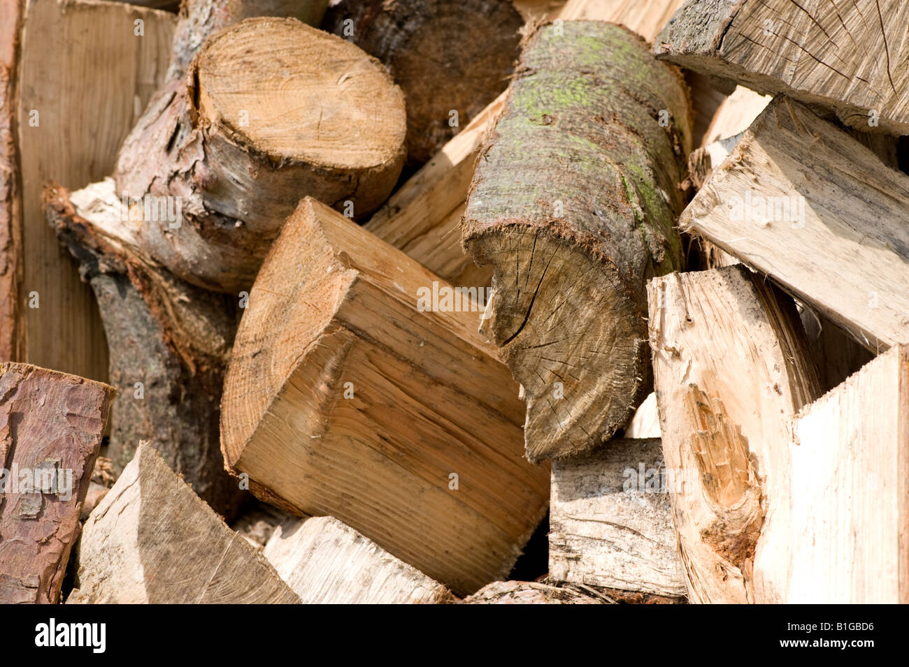 Pile of wood logs, Fire wood Stock Photo - Alamy