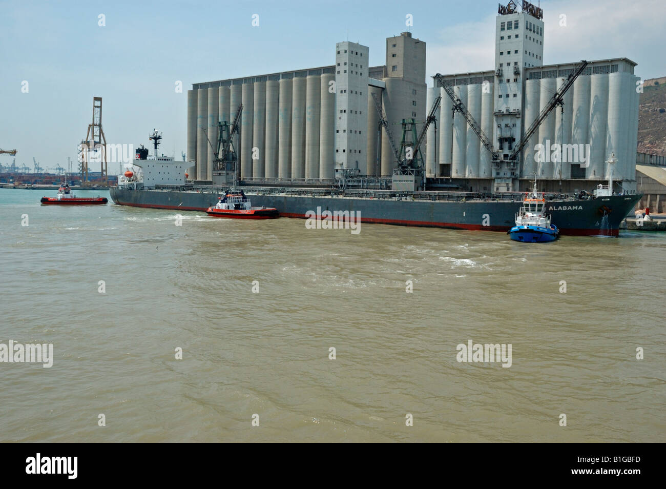 Three Tugboats prepare to move the Freighter Alabama away from the ...