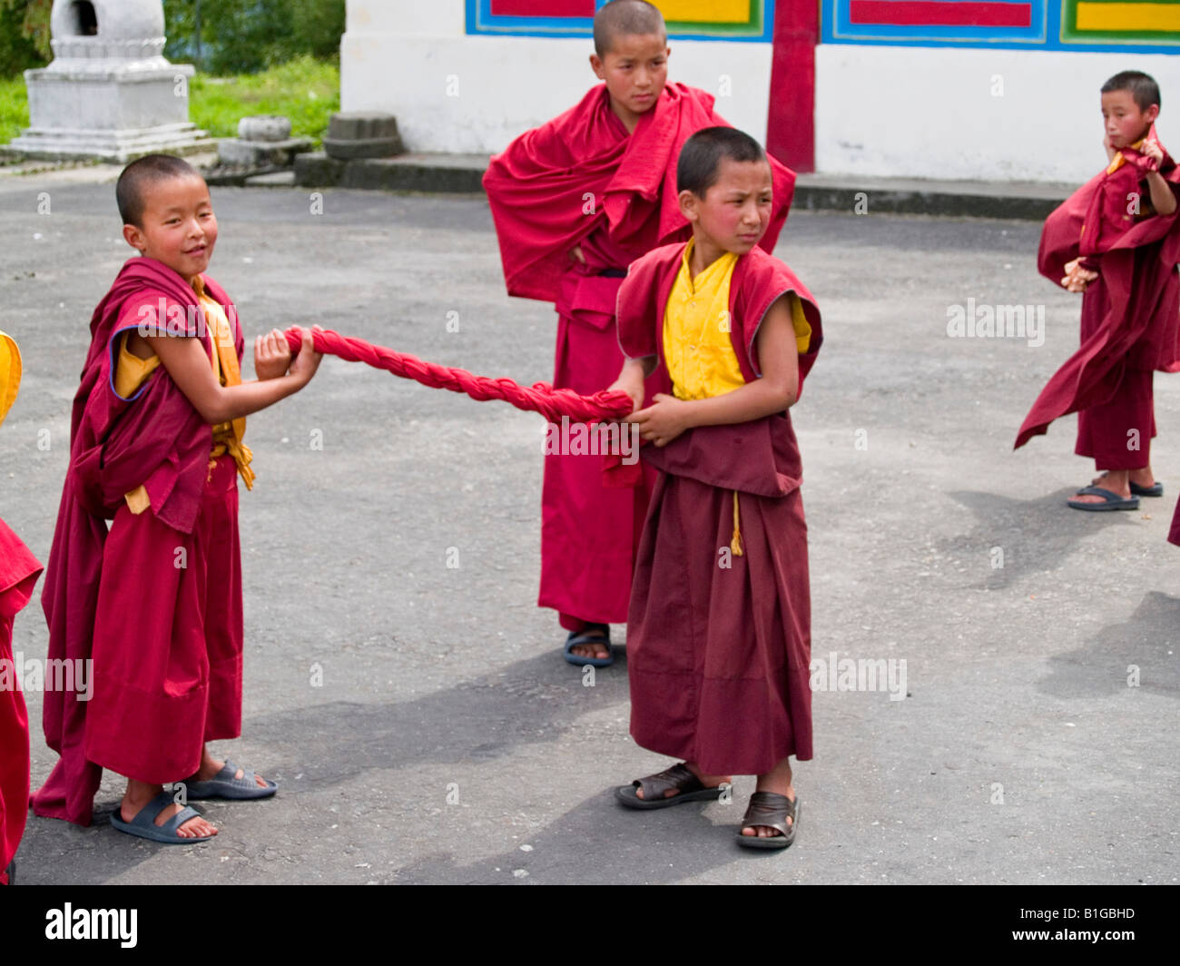 Tibetan monks in Sikkim folding robes Stock Photo - Alamy