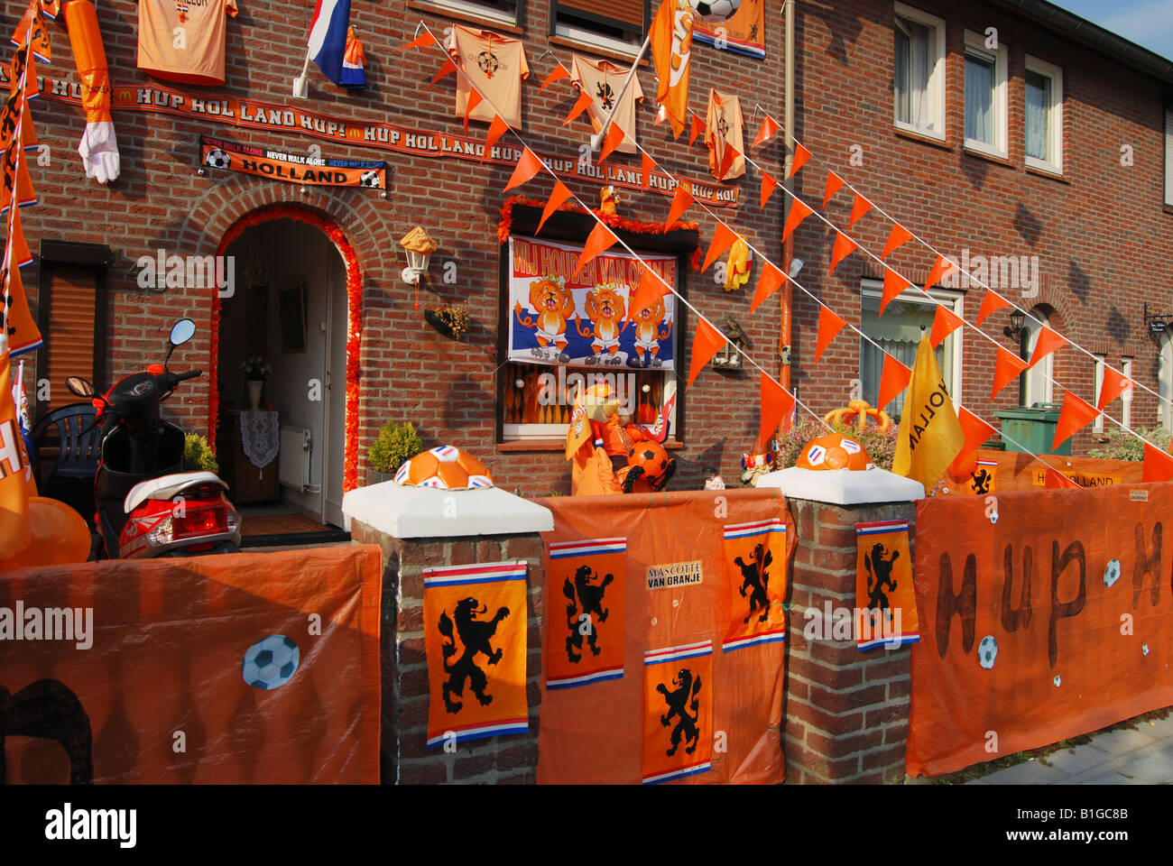 Dutch house decorated with orange banners in support of the national ...
