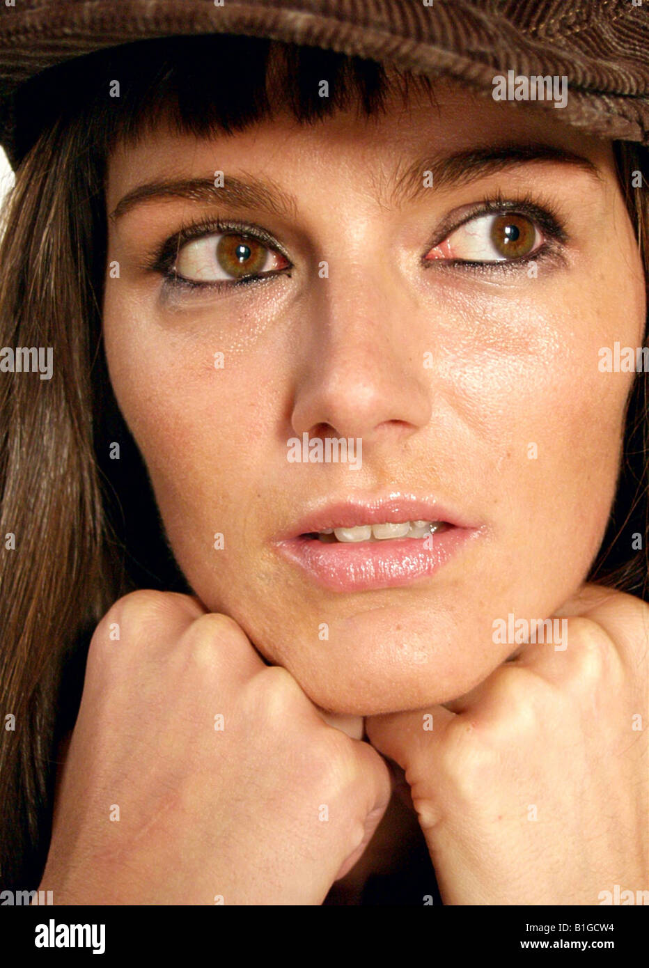 Headshot of a woman thinking Stock Photo - Alamy