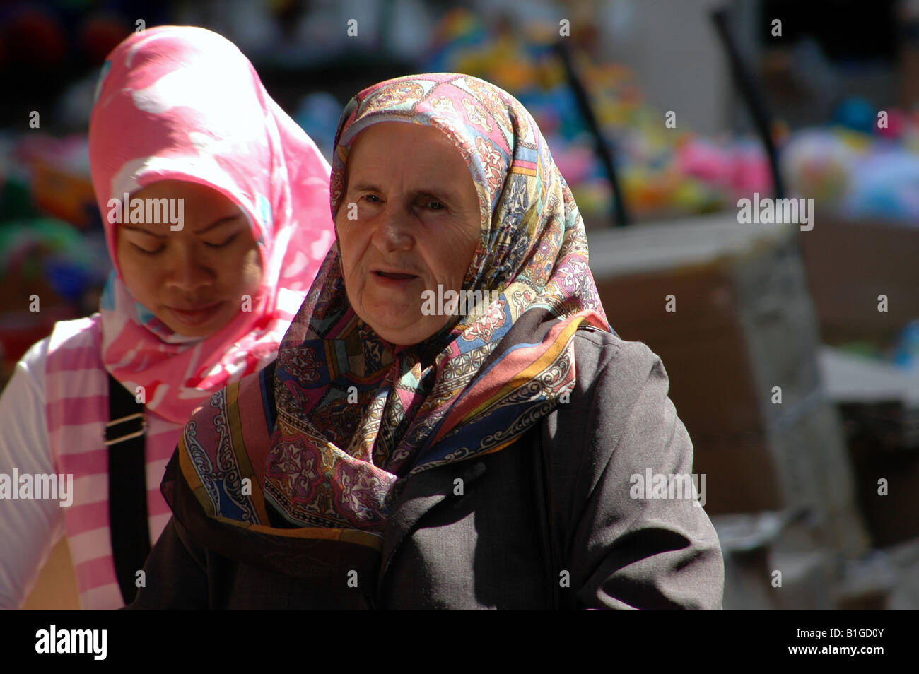 Two lady wearing scarf Stock Photo - Alamy