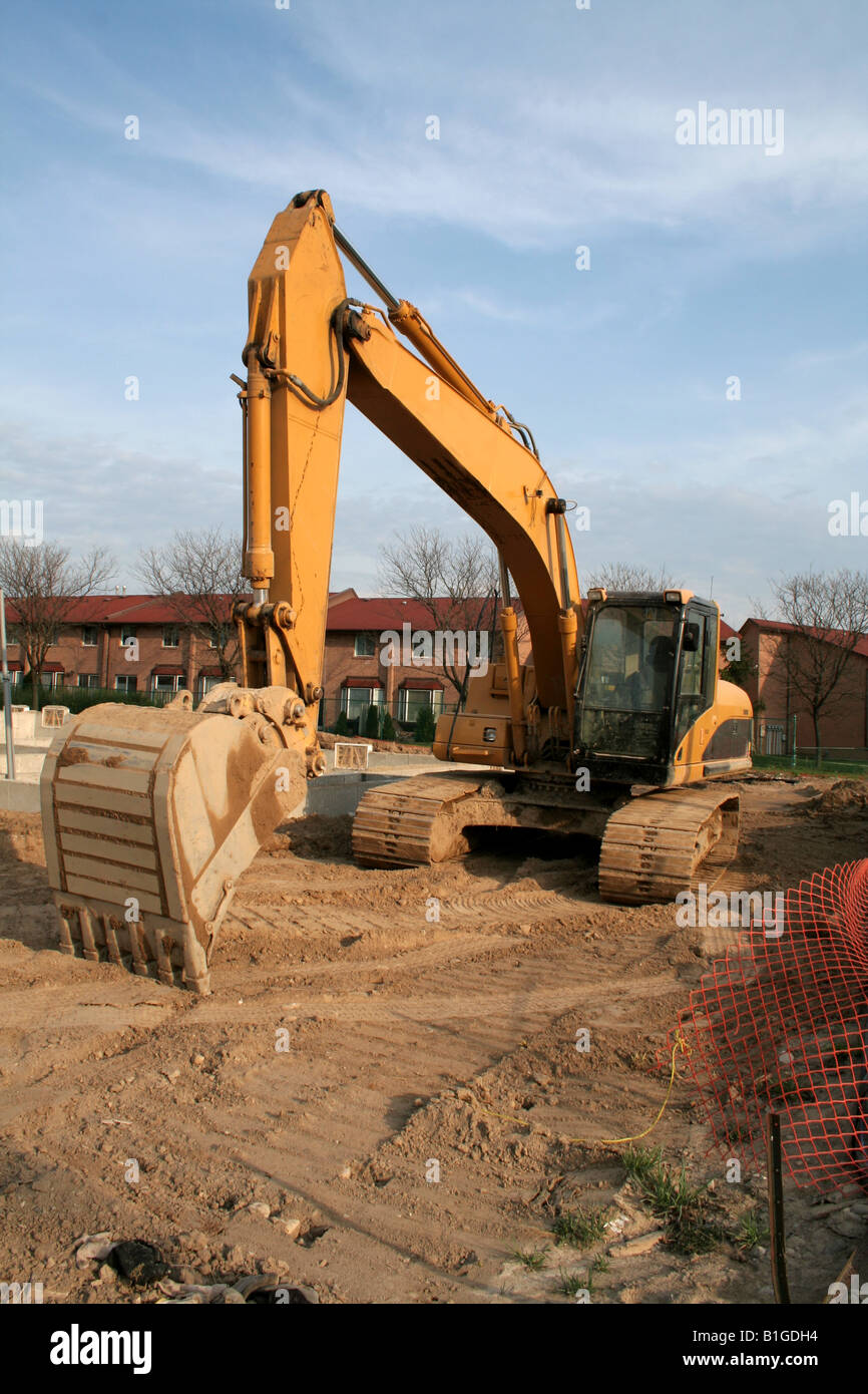 Backhoe at a Construction Site Stock Photo - Alamy