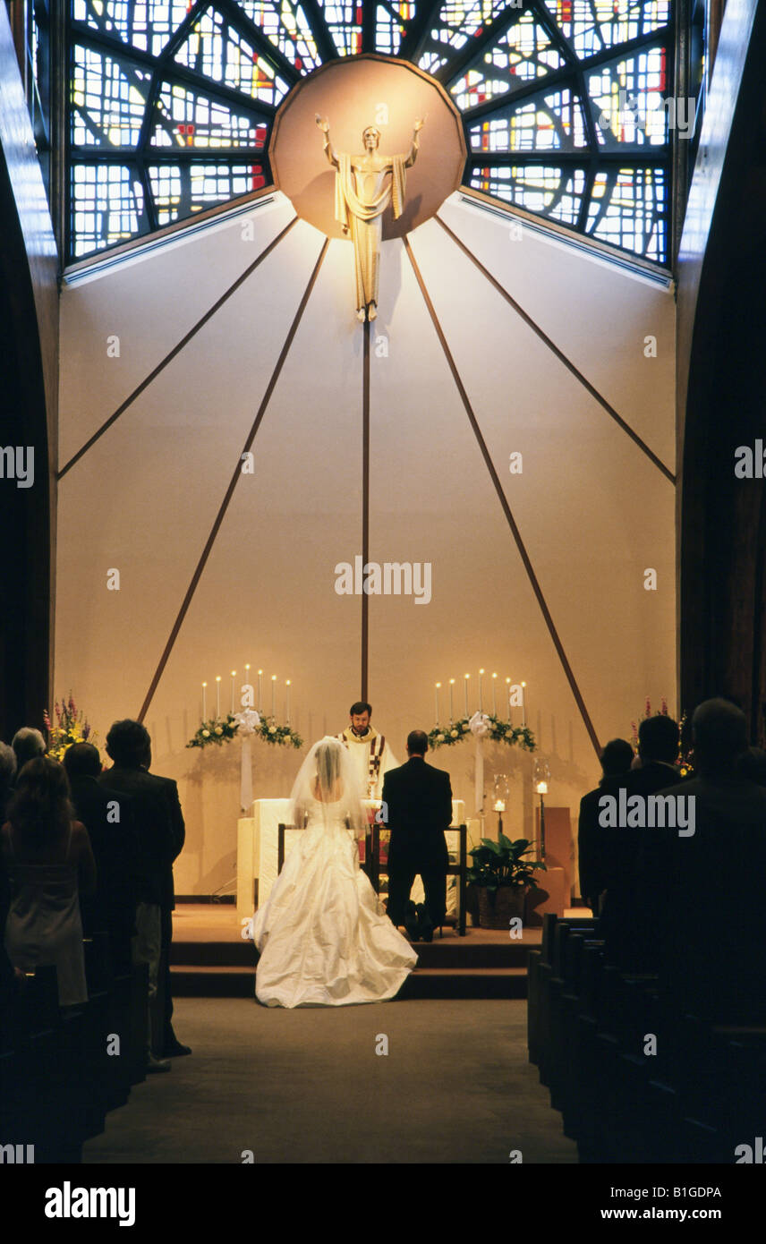 Bride and groom, at altar with priest, Miami Stock Photo - Alamy