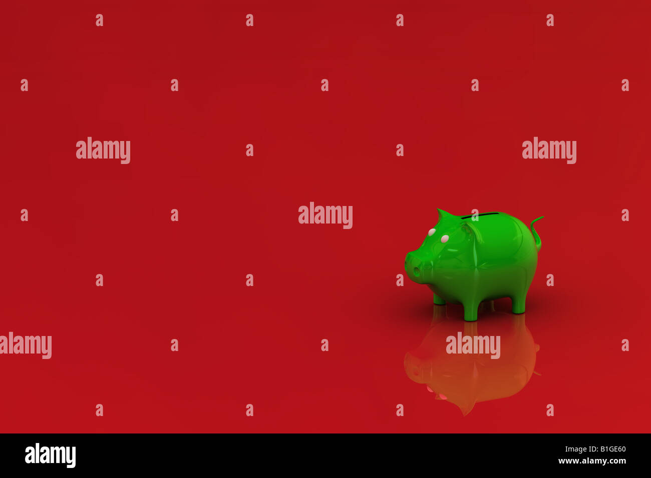 Green piggy bank over red glossy background Stock Photo - Alamy