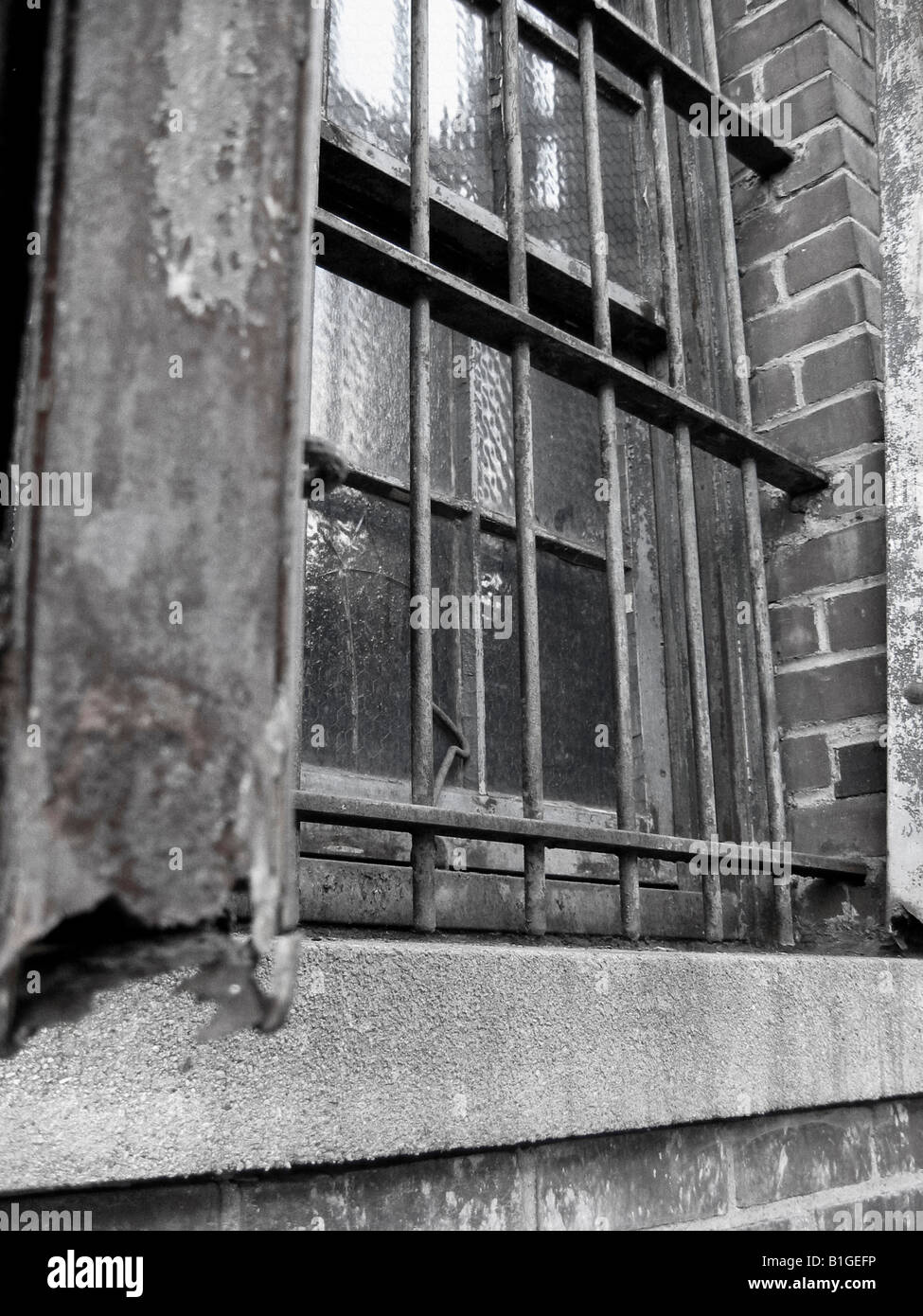 Broken window on the side of a historic building in the Distillery ...