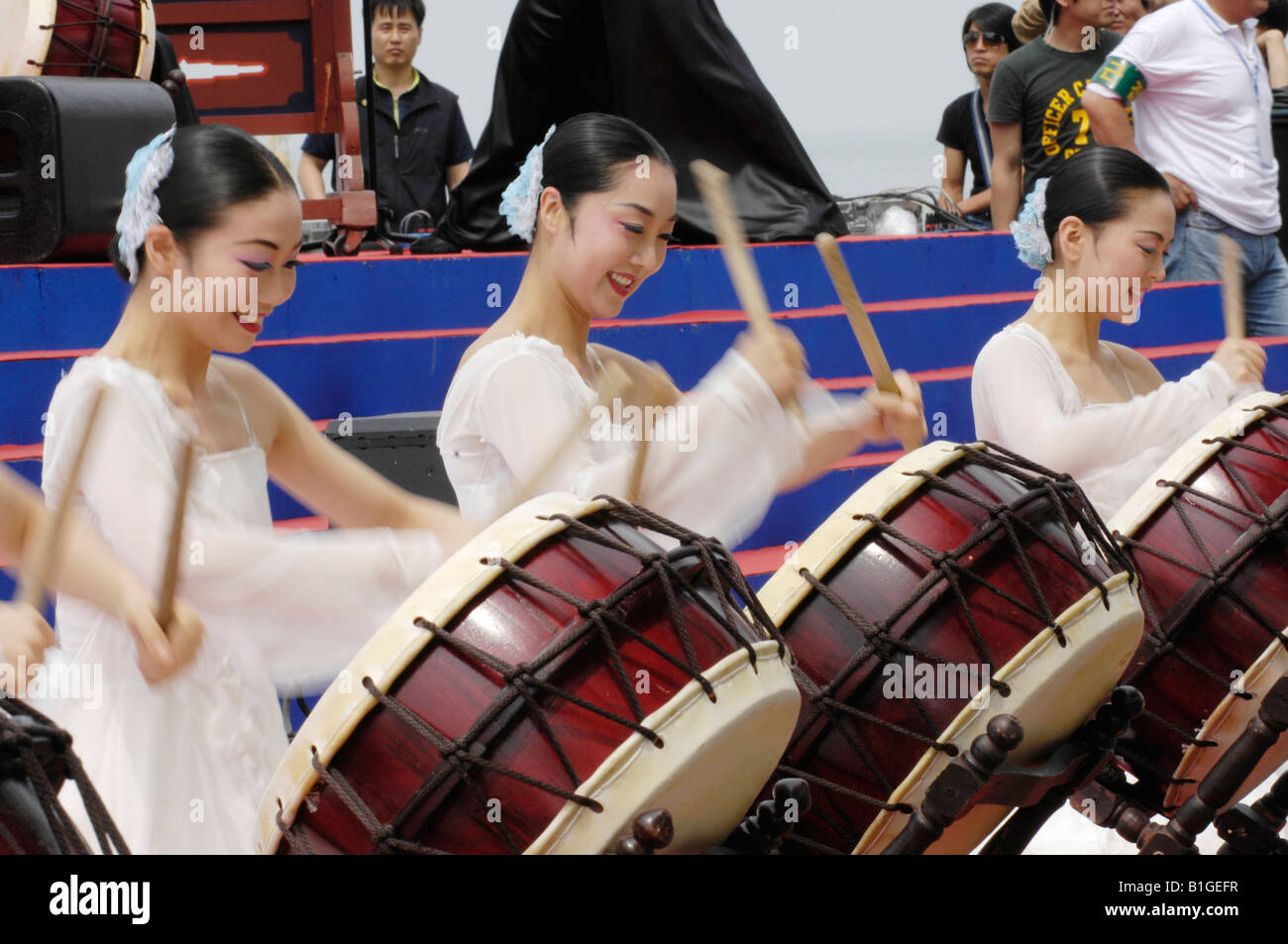 Traditional female Korean drummers perform San Hwasung City in the ...