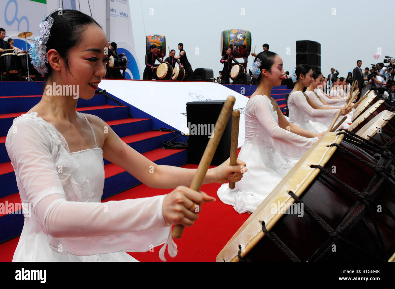 Traditional female Korean drummers perform San Hwasung City in the ...