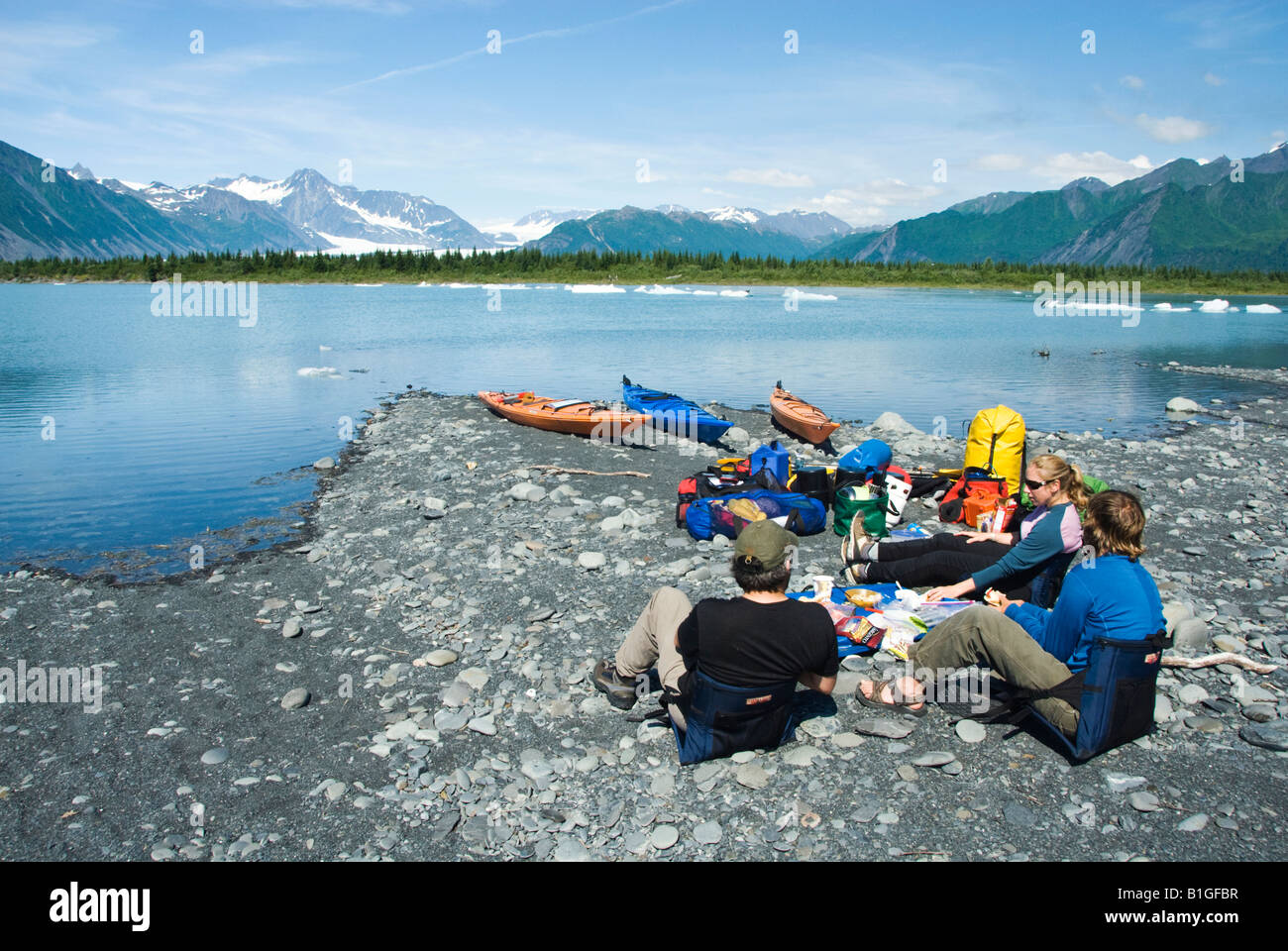 Taking a lunch break from a kayak trip at Bear Glacier Kenai Fjords ...