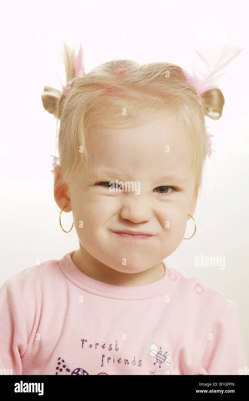 Little girl making grimace. Portrait Stock Photo - Alamy