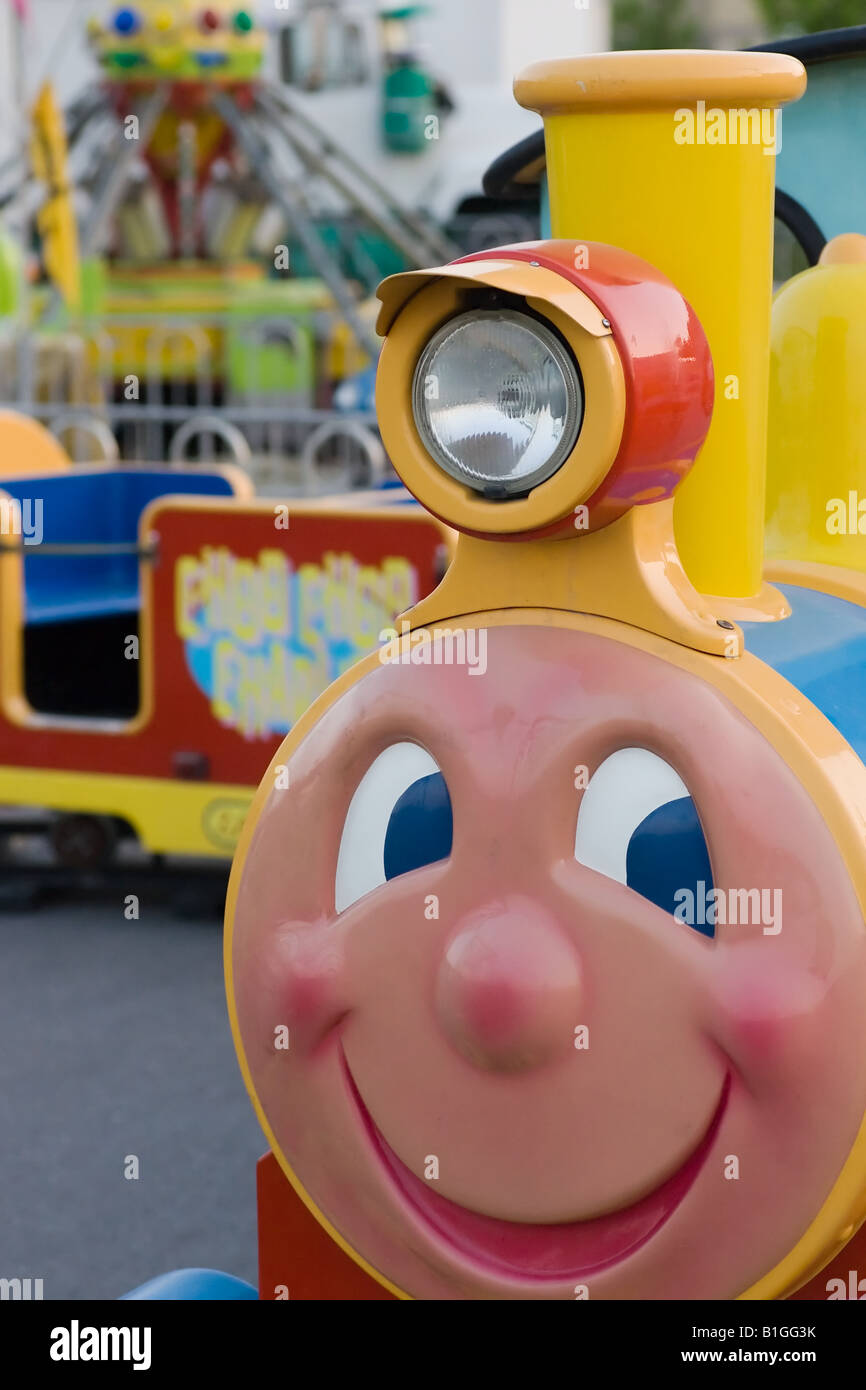 Happy face amusement ride Stock Photo - Alamy