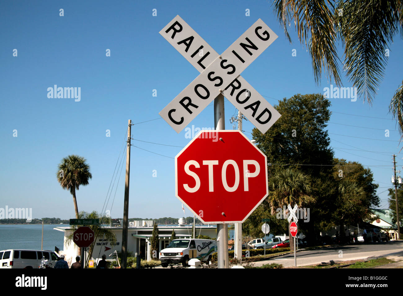 Railroad crossing and stop sign in a lakeside street of Mount Dora in ...