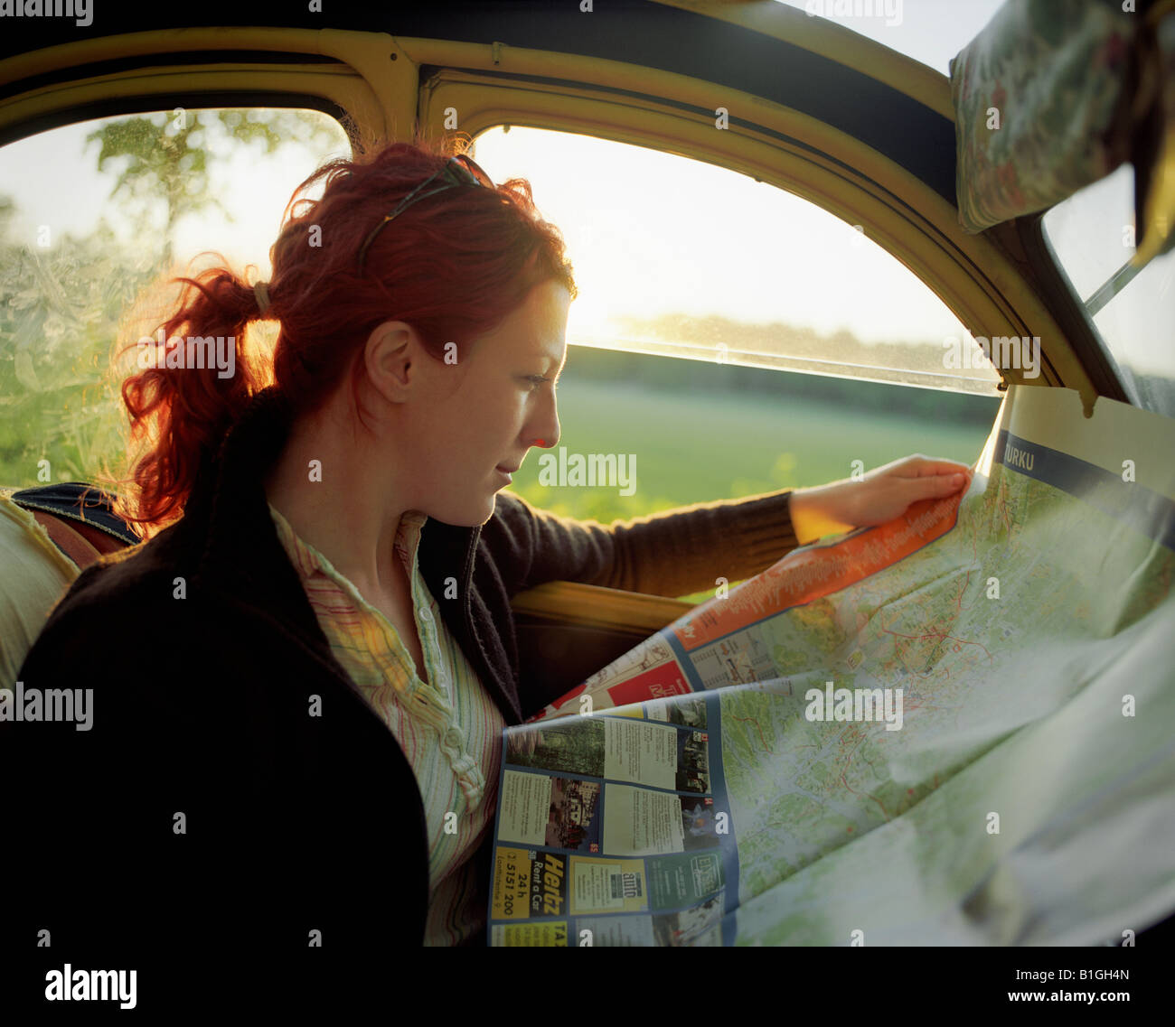 Reading in a car hi-res stock photography and images - Alamy