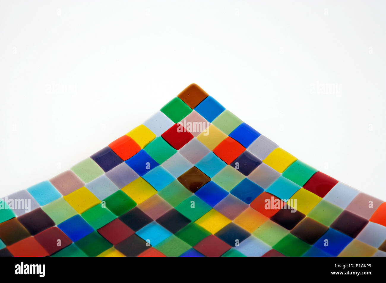 Harlequin pattern on glass plate. Mixture of many colours Stock Photo ...