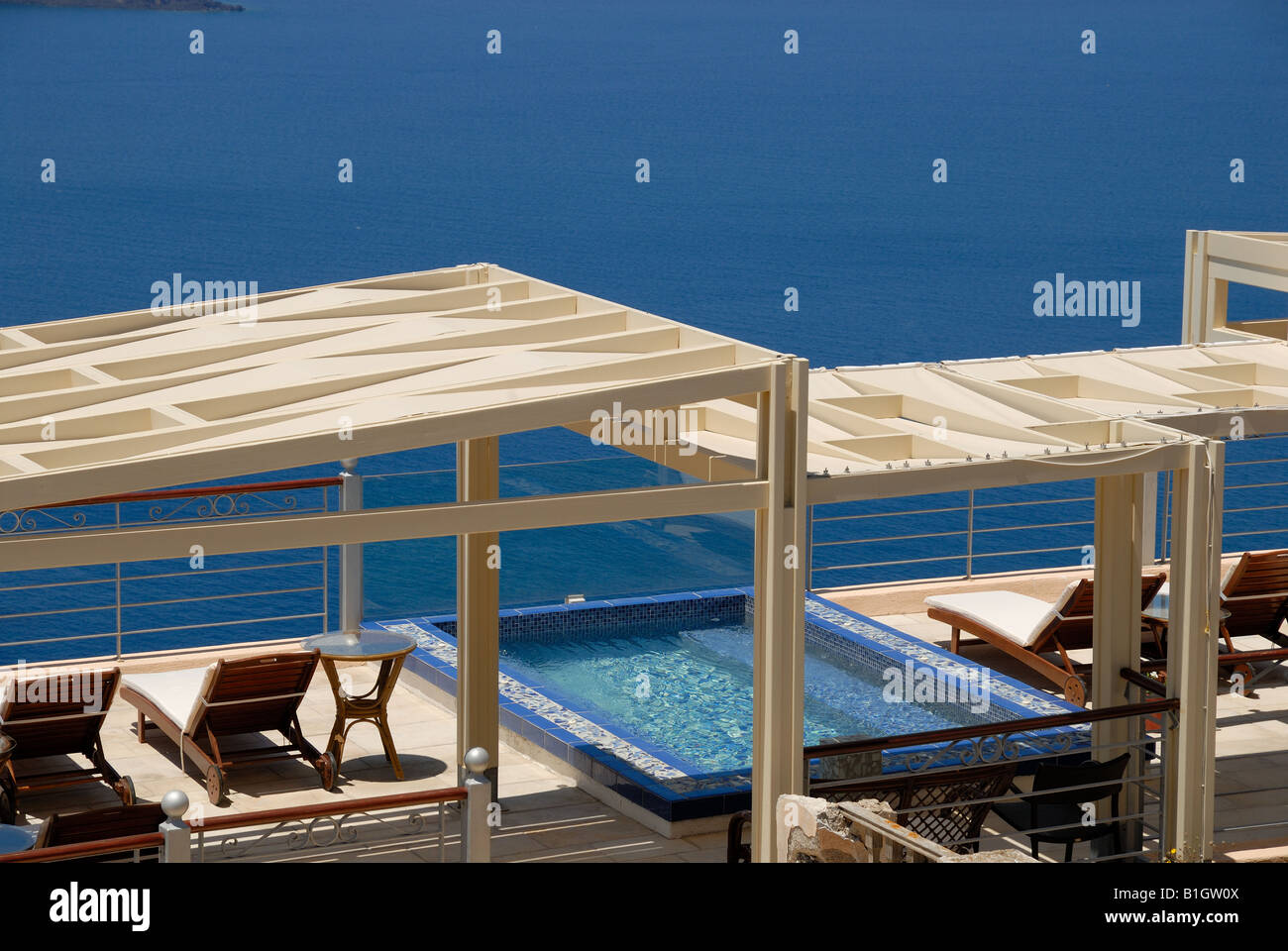 Swimming pool in Santorini, Greece Stock Photo - Alamy