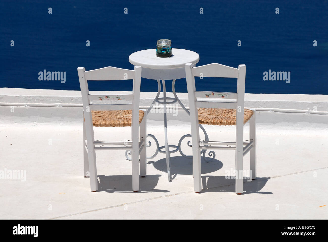 Greek blue table and chairs hi-res stock photography and images - Alamy