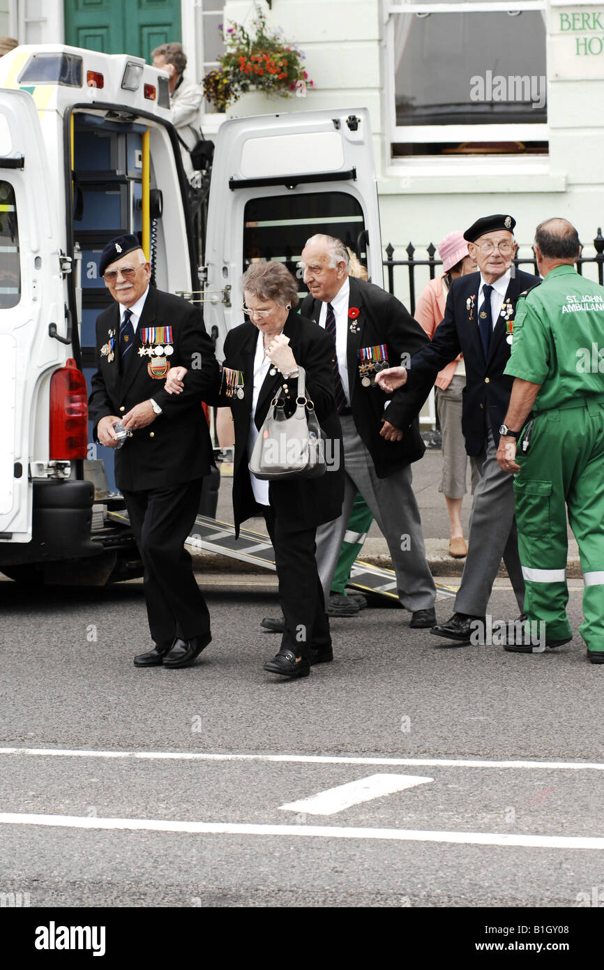 Paramedics helping an old soldier who felt a bit unsteady on his feet ...