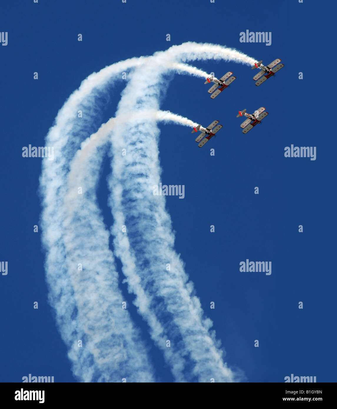 Barnstorming biplanes in flight maneuver Stock Photo - Alamy