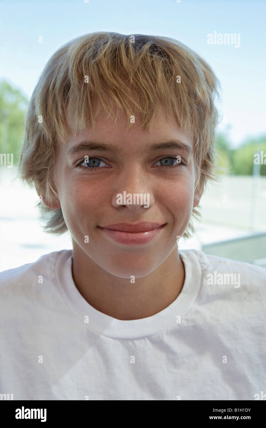 Teenage boy (13-15) smiling, outdoors, portrait Stock Photo - Alamy