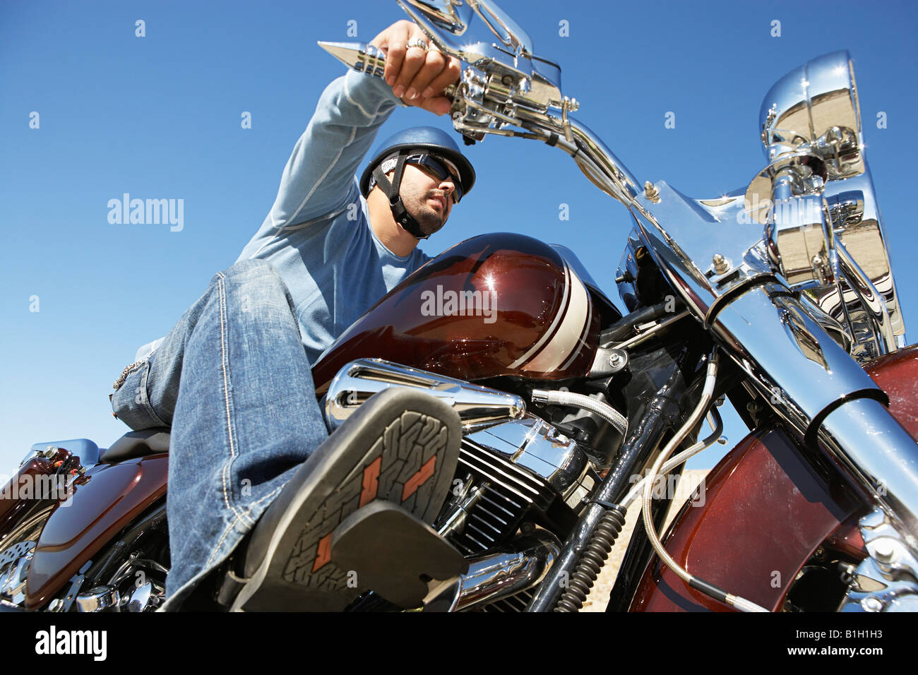 Biker riding motorcycle low angle hi-res stock photography and images ...