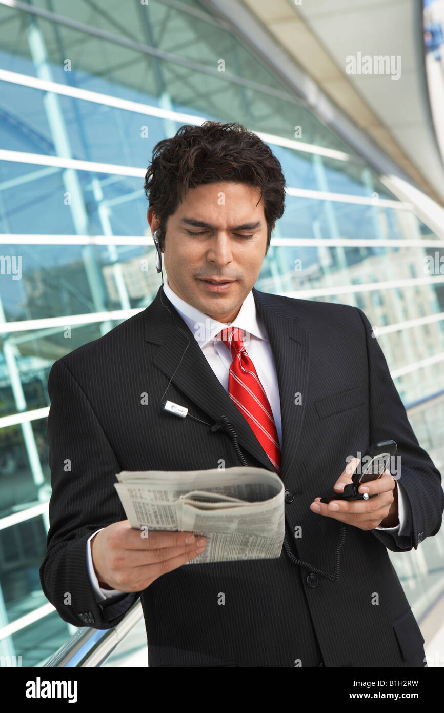 Mobile newspaper hi-res stock photography and images - Alamy