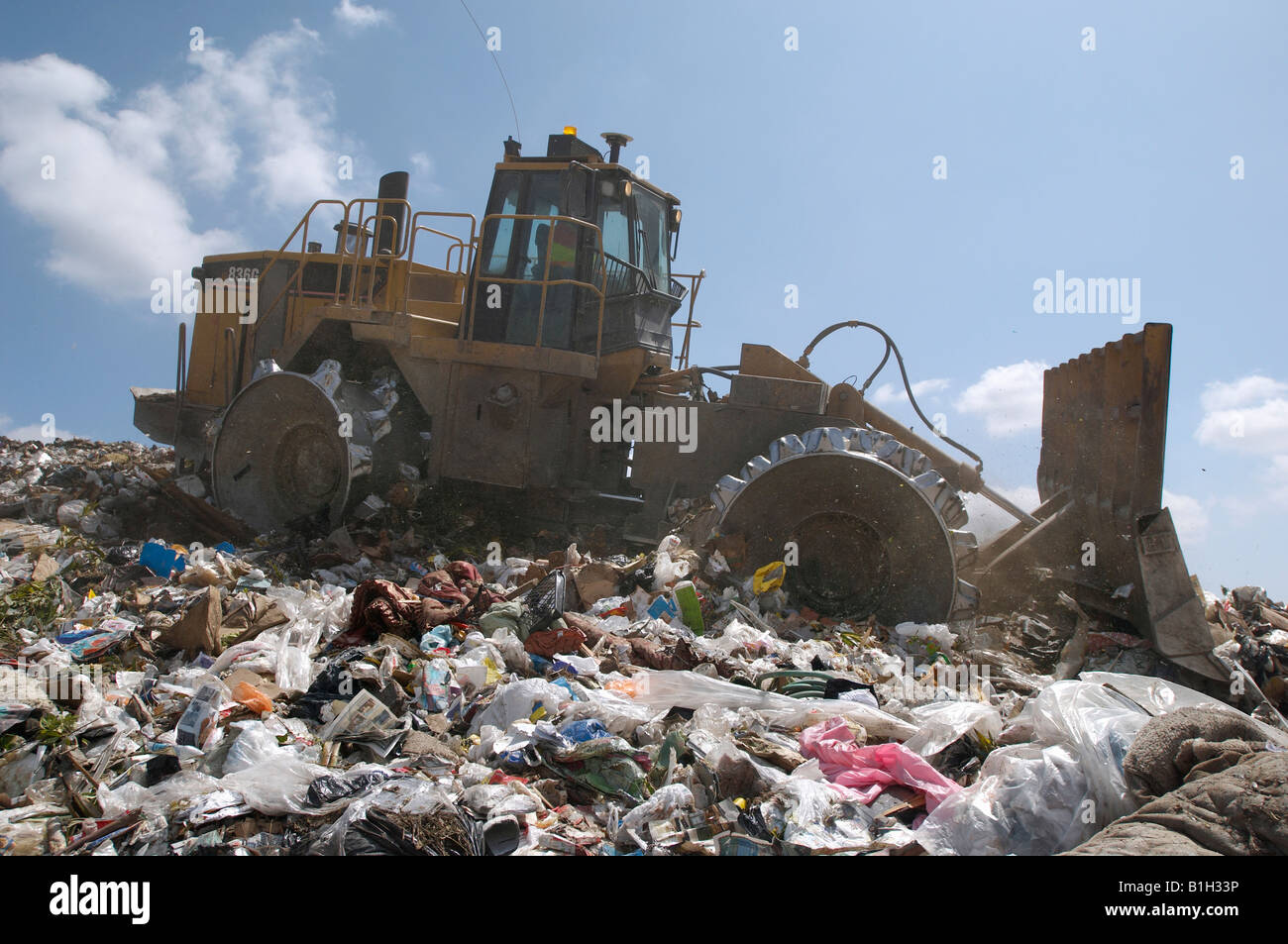 Digger working at landfill site hi-res stock photography and images - Alamy