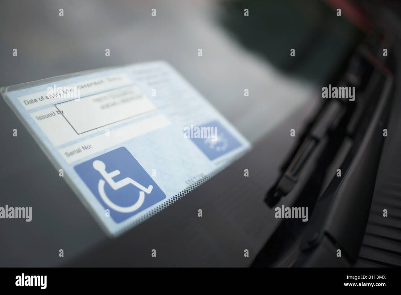 Handicap sticker on windshield Stock Photo - Alamy