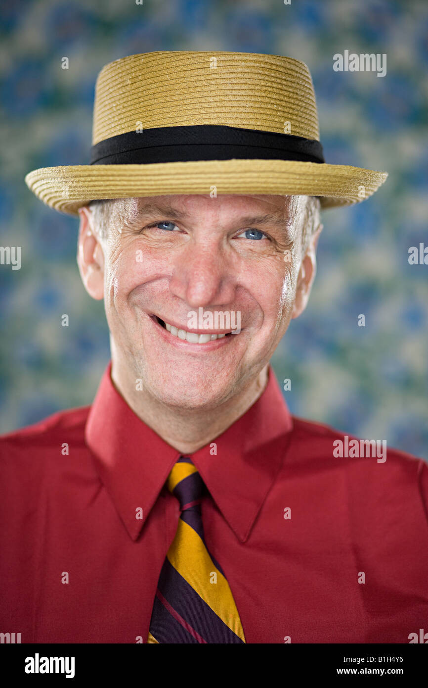 Man wearing straw hat Stock Photo - Alamy