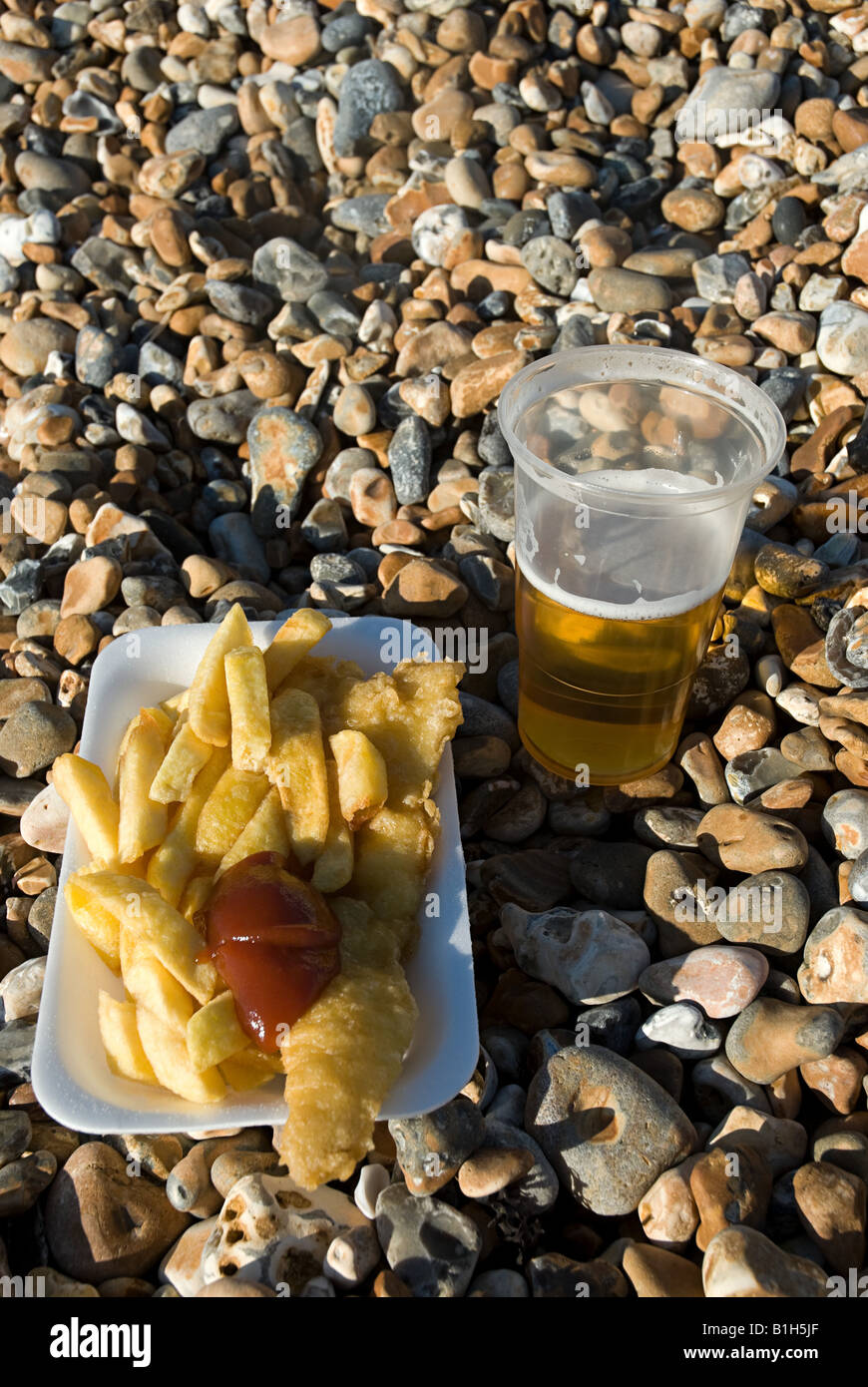 Fish and chips and lager Stock Photo - Alamy