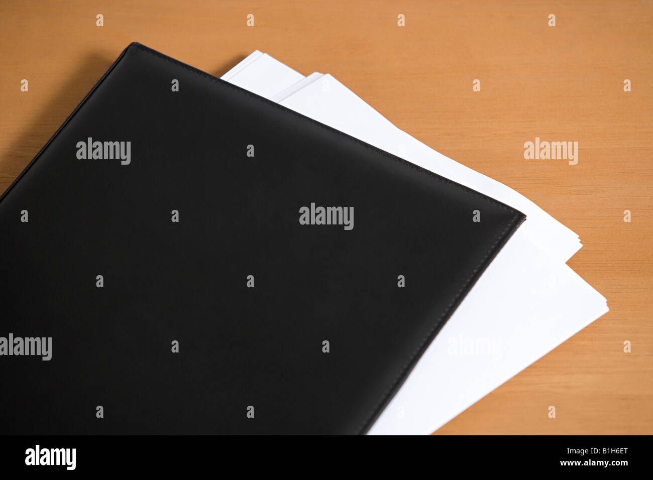 A folder on a desk Stock Photo - Alamy