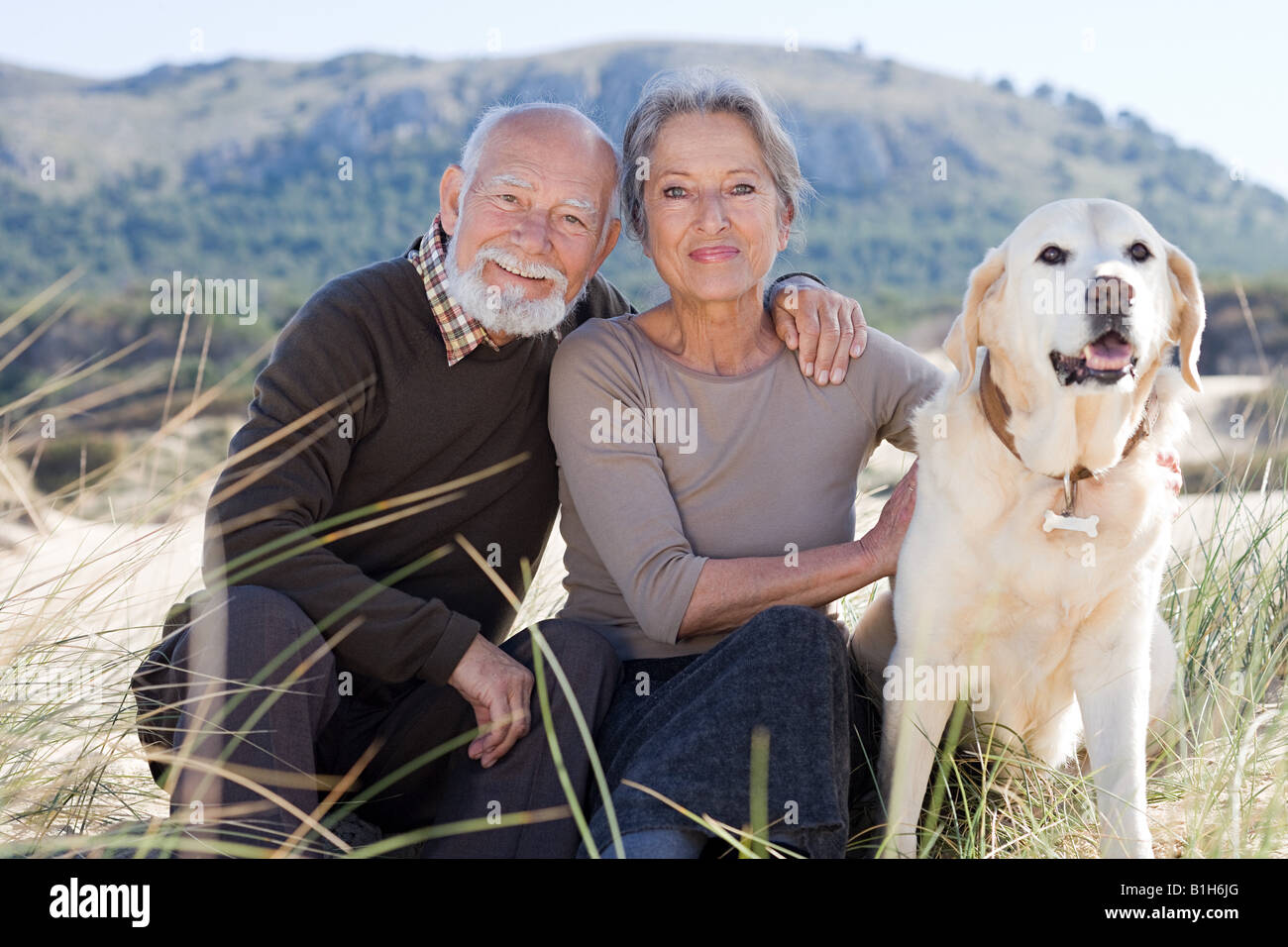 Old couple with a dog hi-res stock photography and images - Alamy