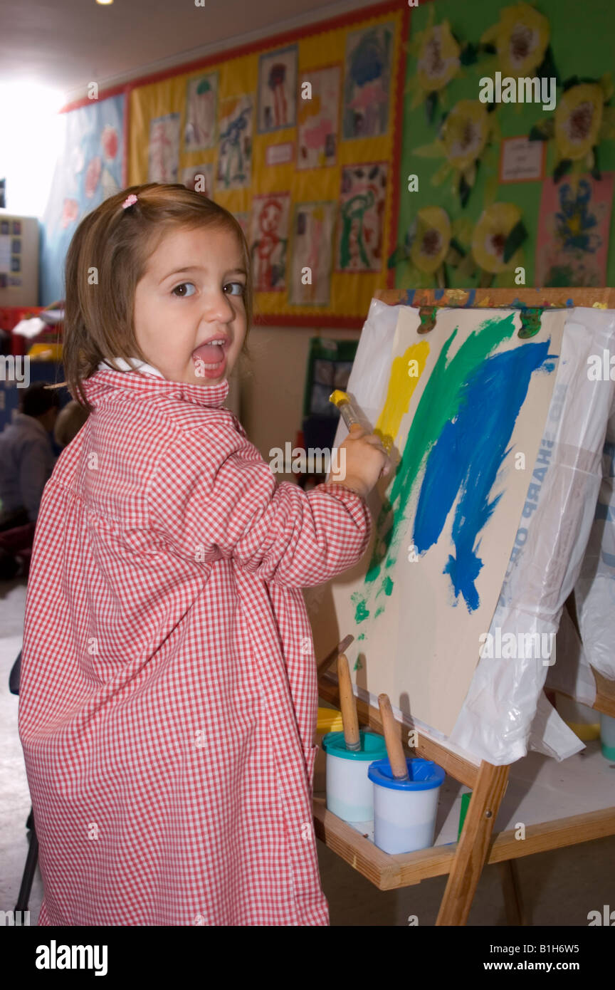 little girl painting in school Stock Photo - Alamy