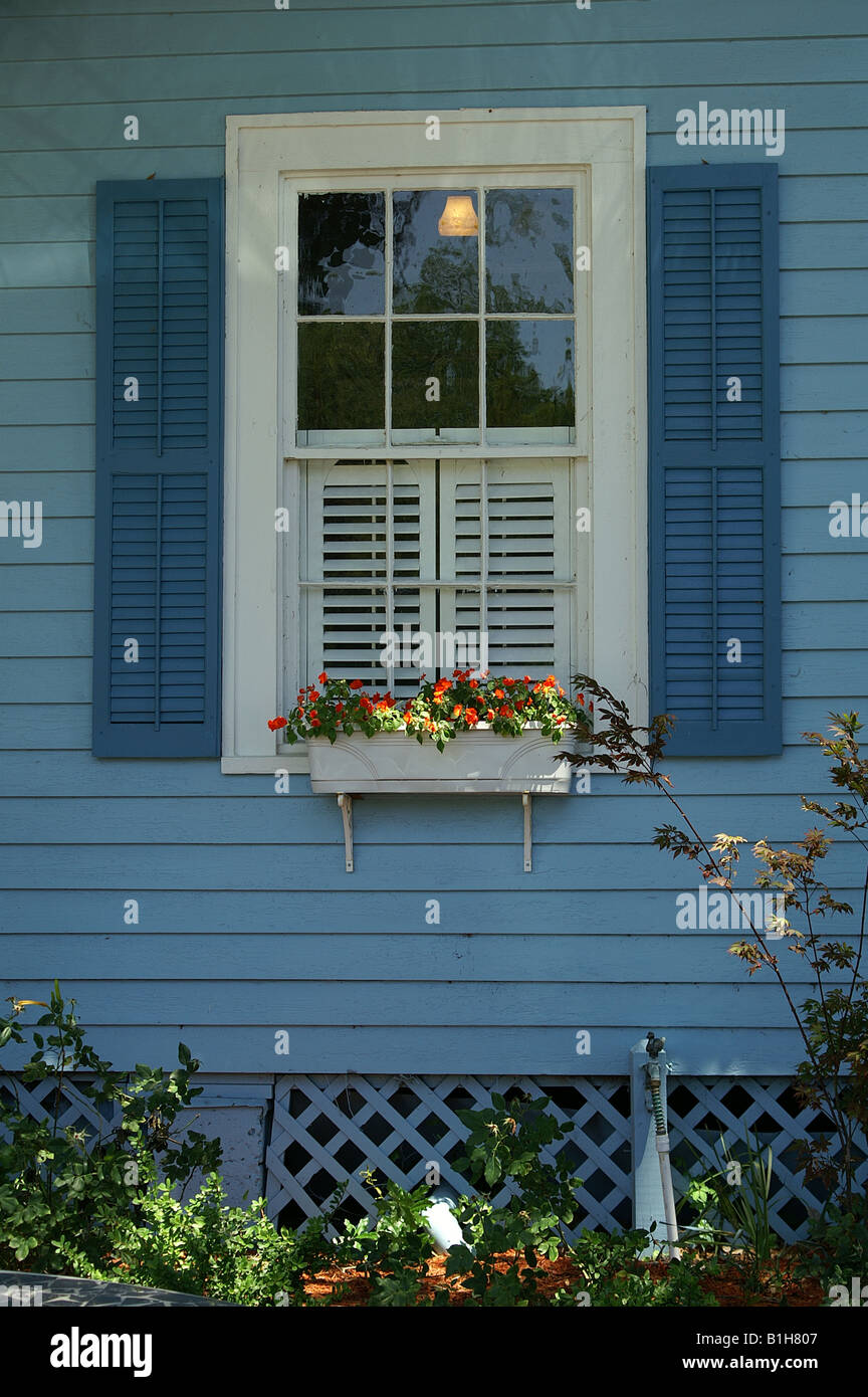Window with blue shutters Stock Photo - Alamy