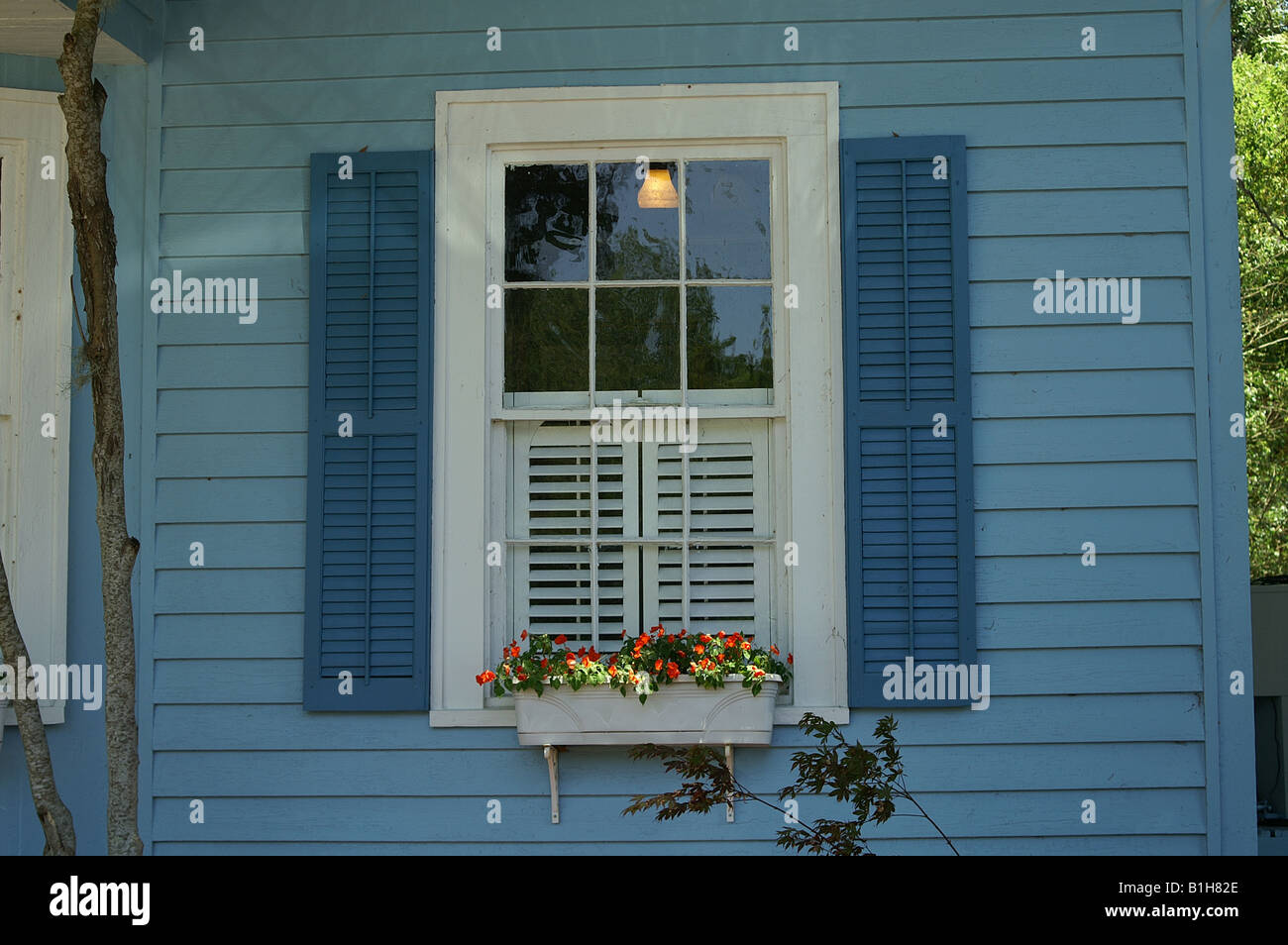 Window with blue shutters Stock Photo - Alamy