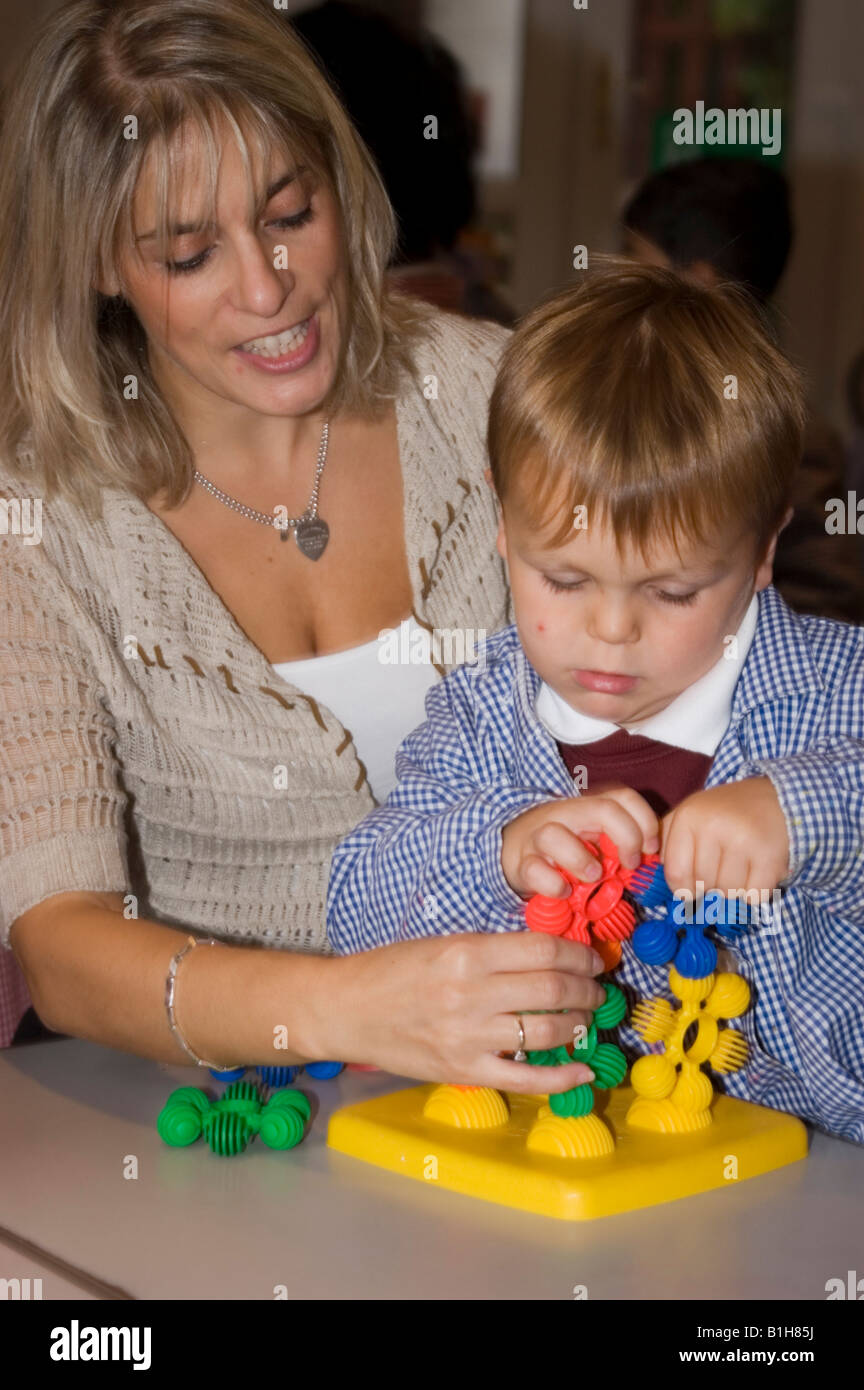 Kindergarten children assistant hi-res stock photography and images - Alamy