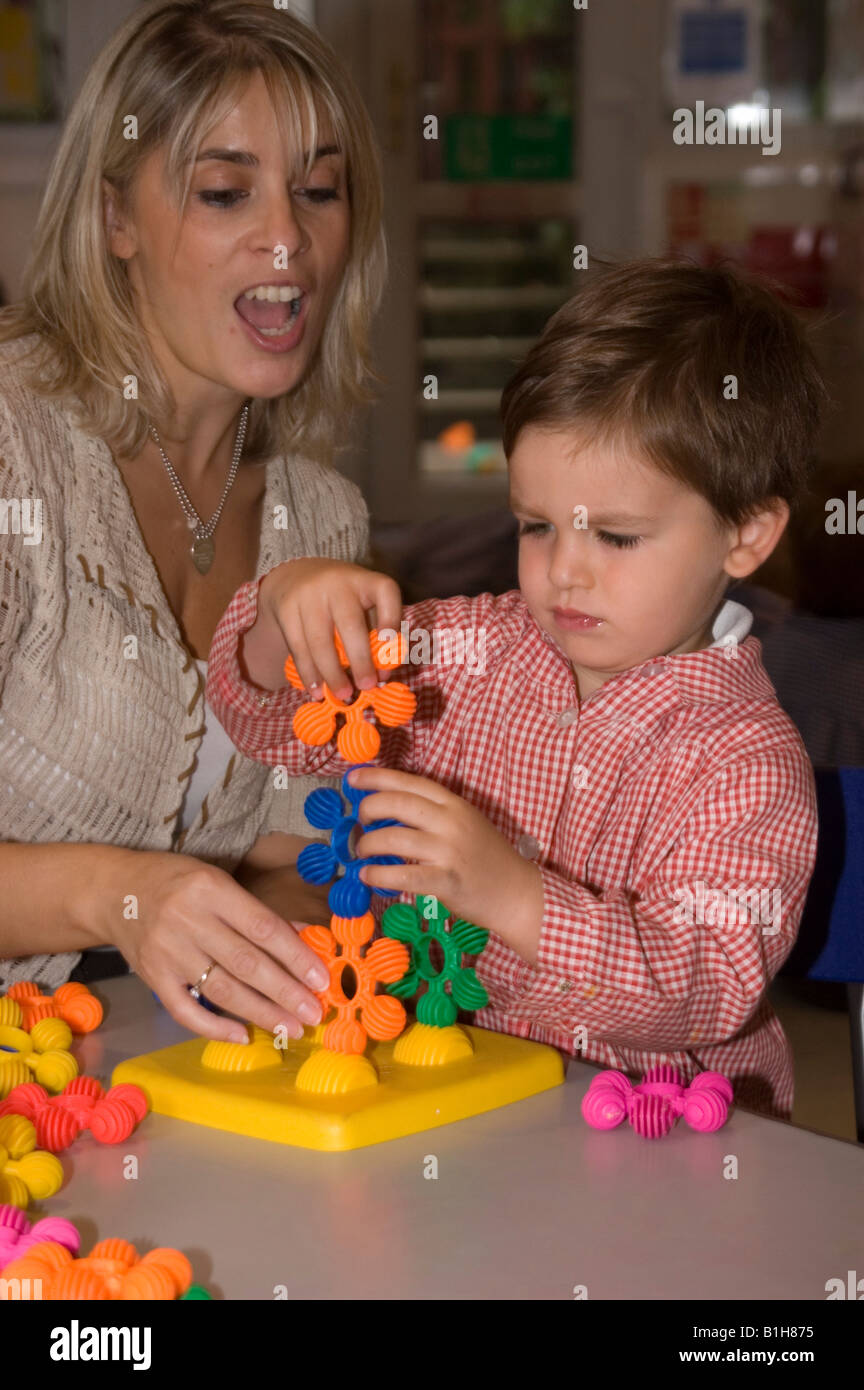 Kindergarten children assistant hi-res stock photography and images - Alamy