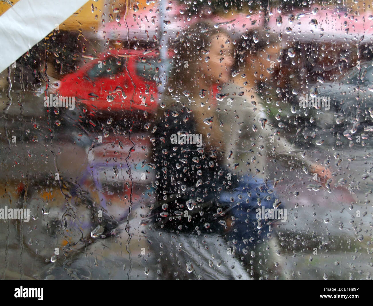 abstract street scene with rain drops on window Stock Photo - Alamy